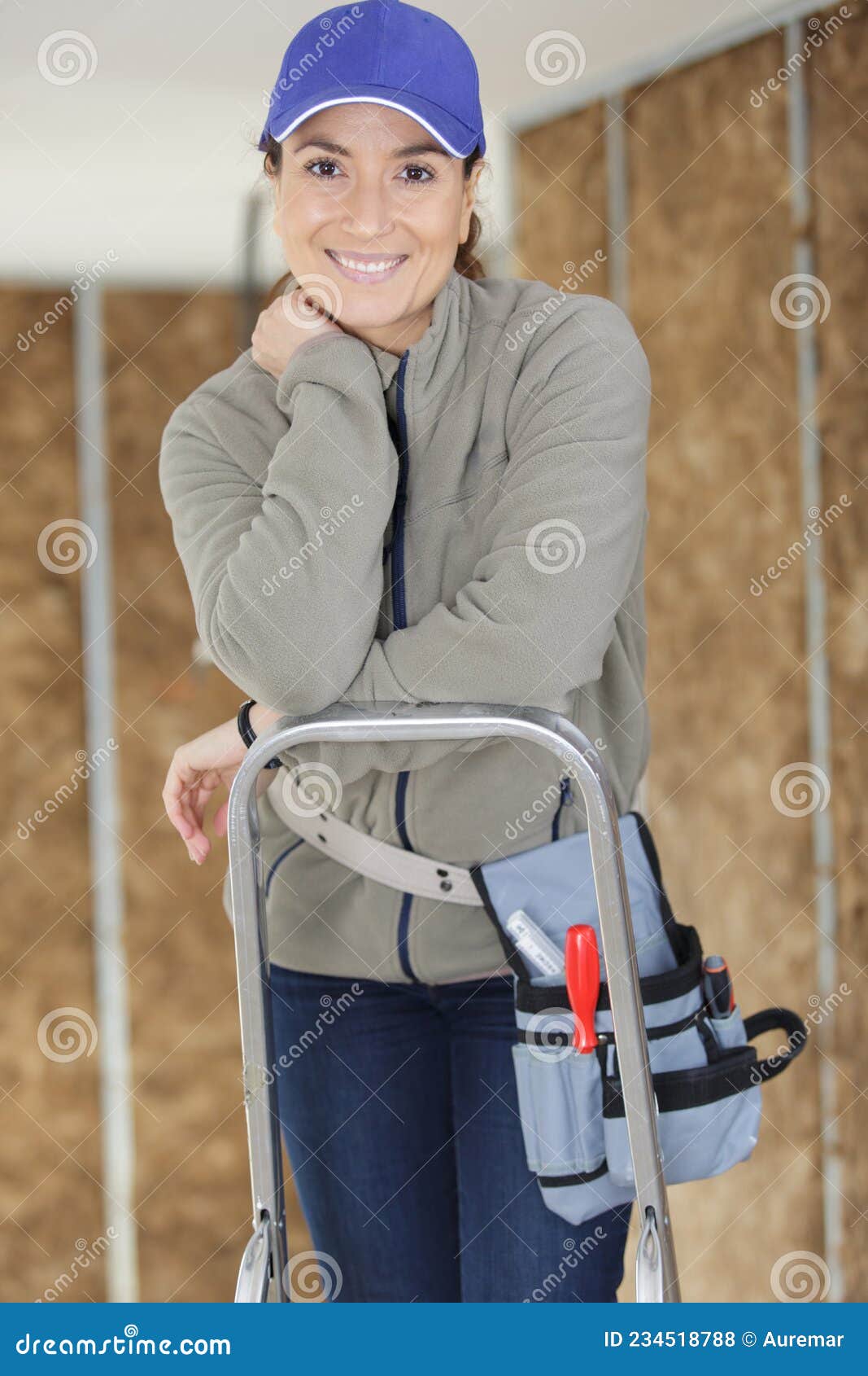 Young Woman Builder Stands on Stepladder Stock Photo - Image of ...