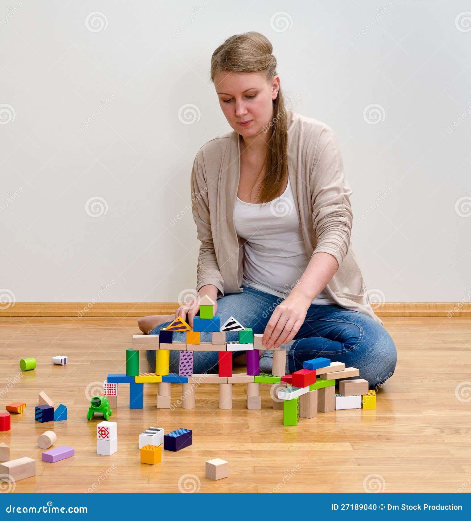 Young Woman Building a House Stock Photo - Image of cube, home: 27189040