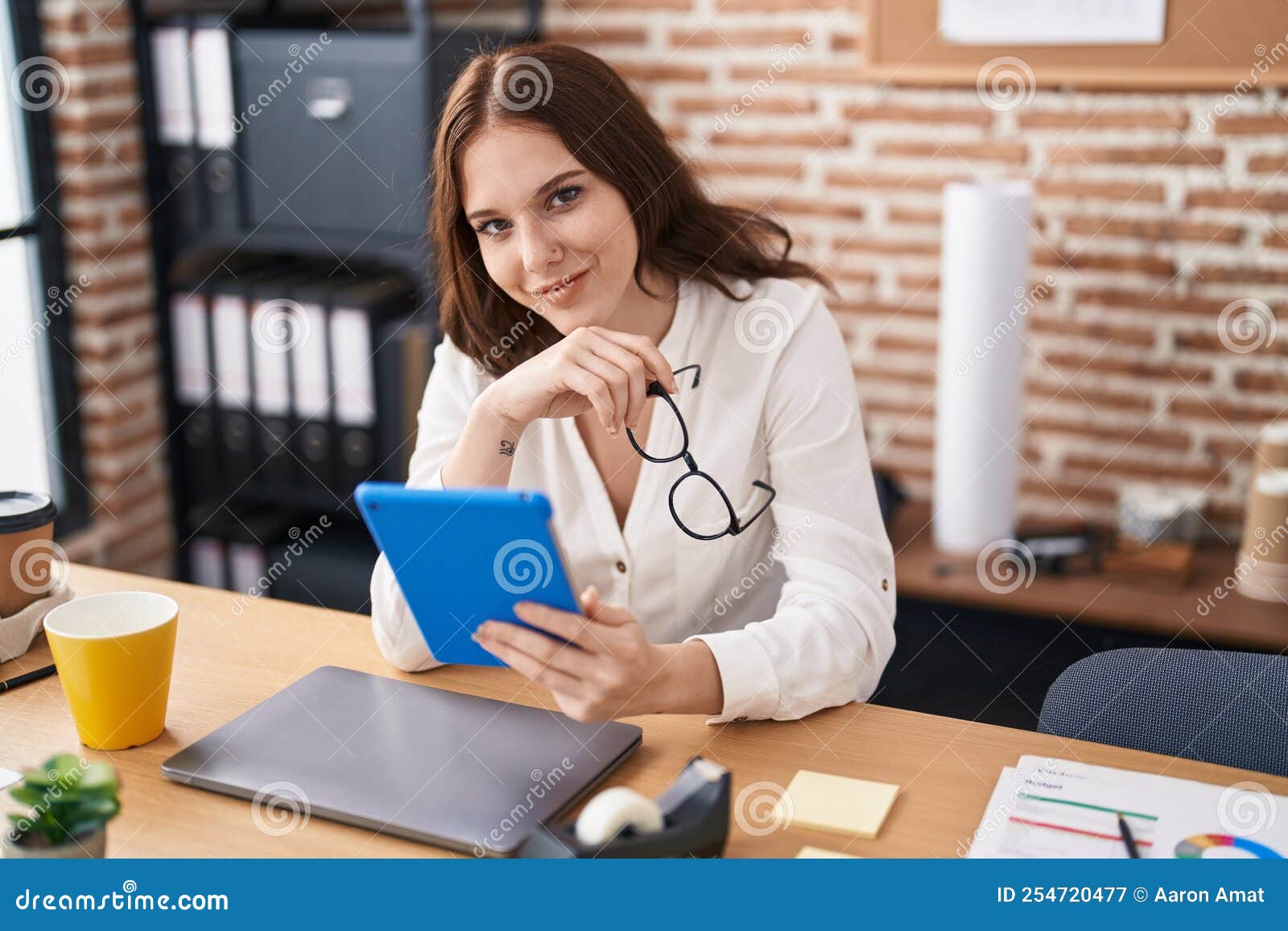 Young Woman Business Worker Using Touchpad Working at Office Stock ...
