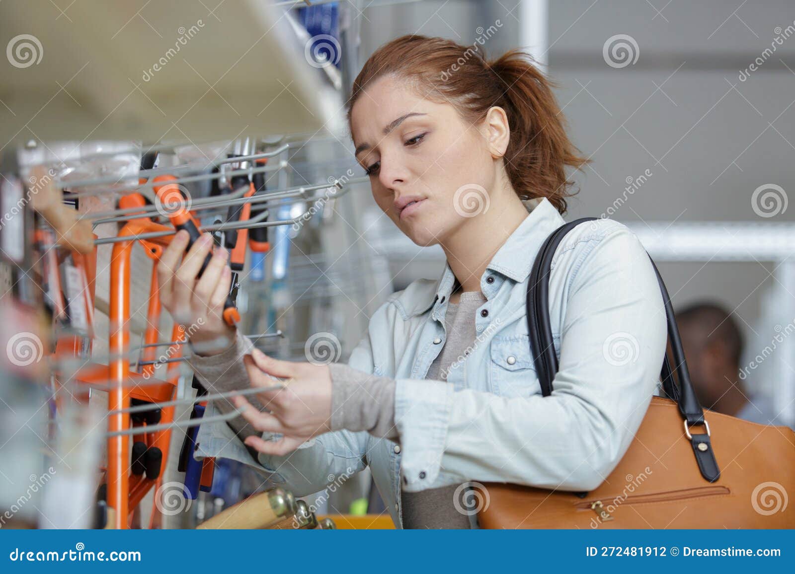 Young Woman Buying Tools in Hardware Store Stock Photo - Image of ...