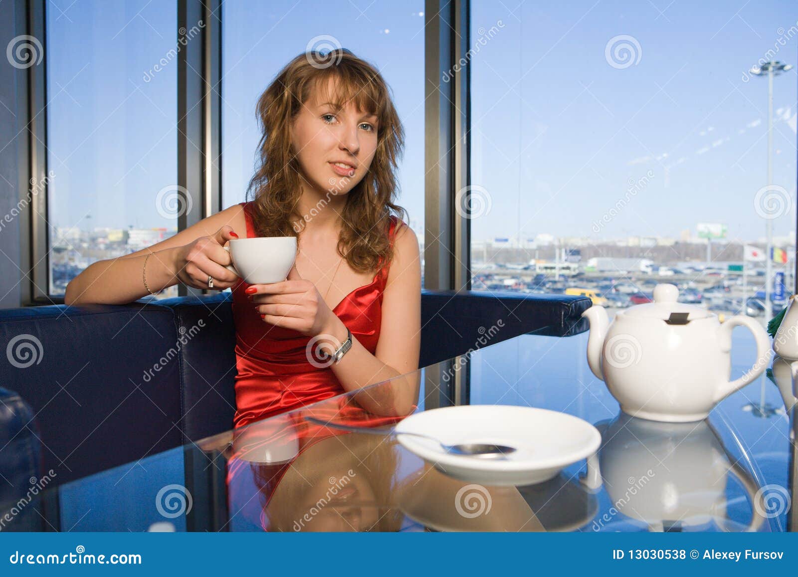 Young woman in cafe stock photo. Image of interior, drinking - 13030538