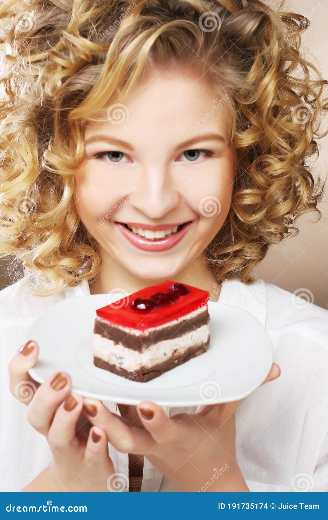 Young woman with a cake stock photo. Image of mouth - 191735174