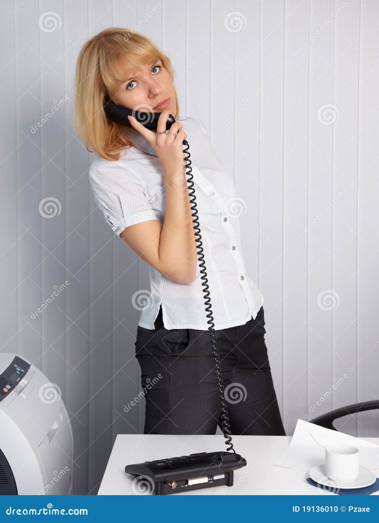 Young woman calls by phone stock photo. Image of desk - 19136010