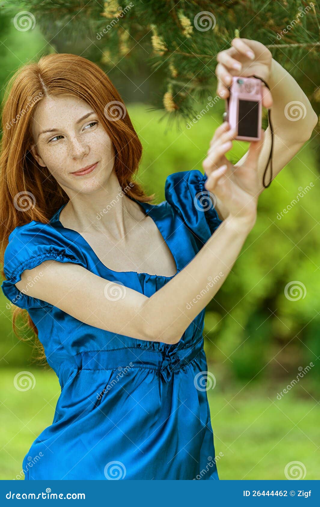 Young woman with camera stock photo. Image of photocamera - 26444462