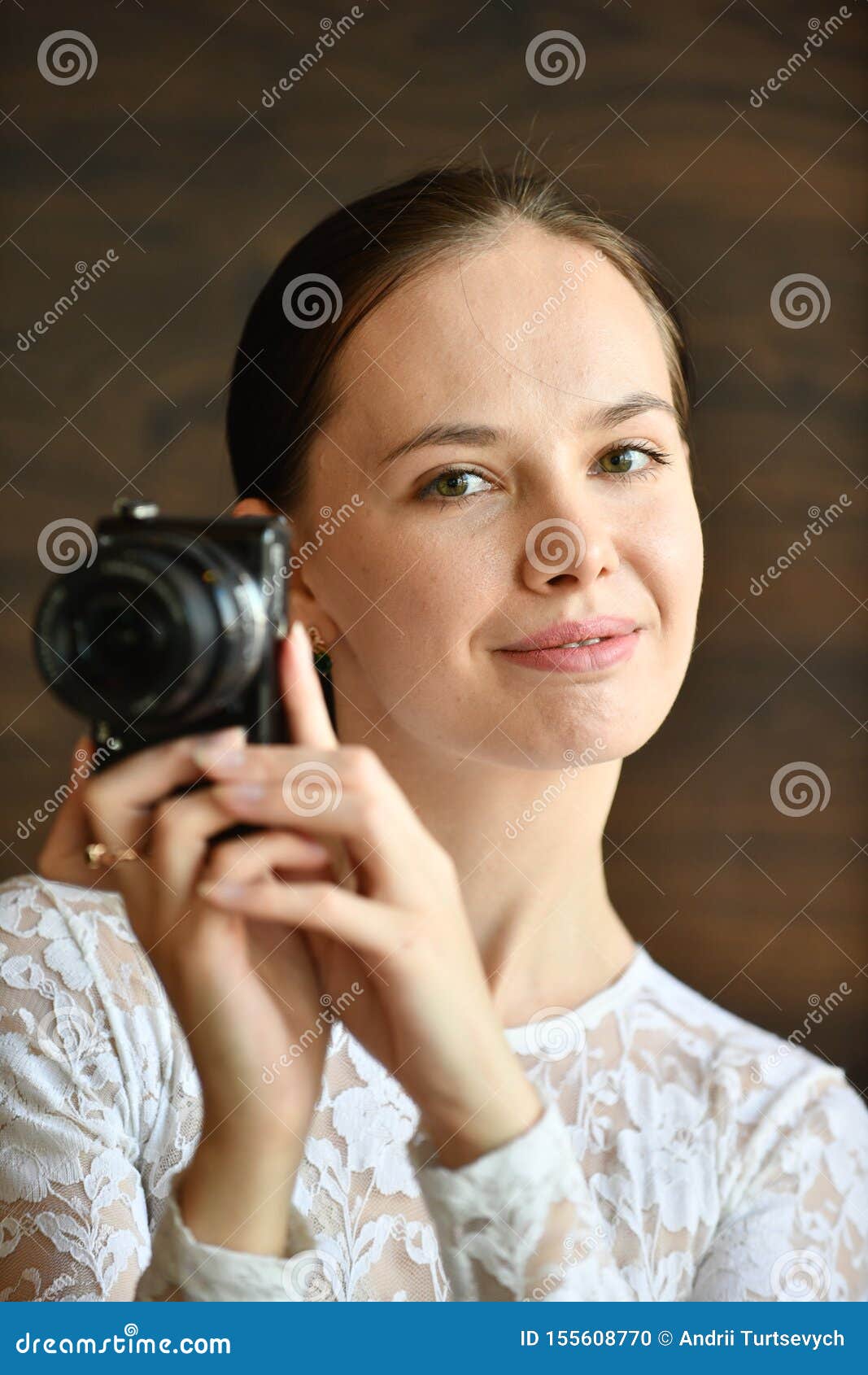 Young woman with camera stock photo. Image of young - 155608770