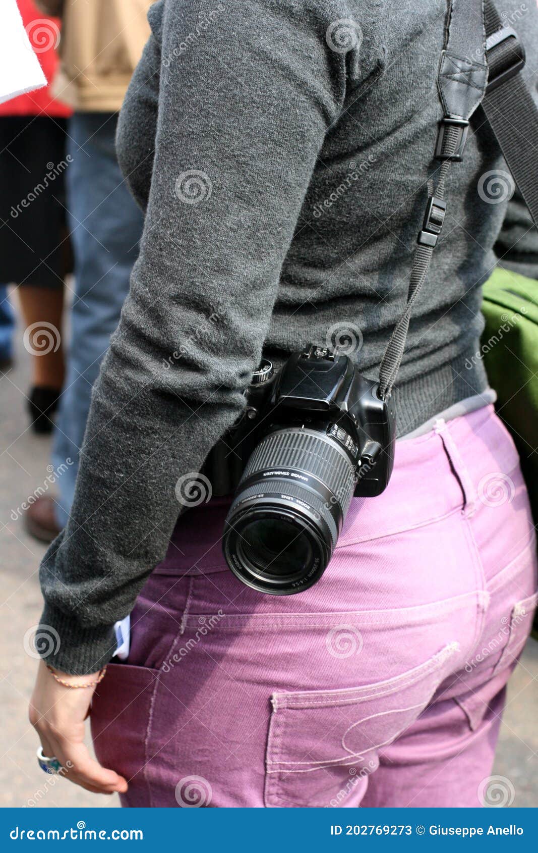 Young Woman with the Camera Over the Shoulder Stock Image - Image of ...