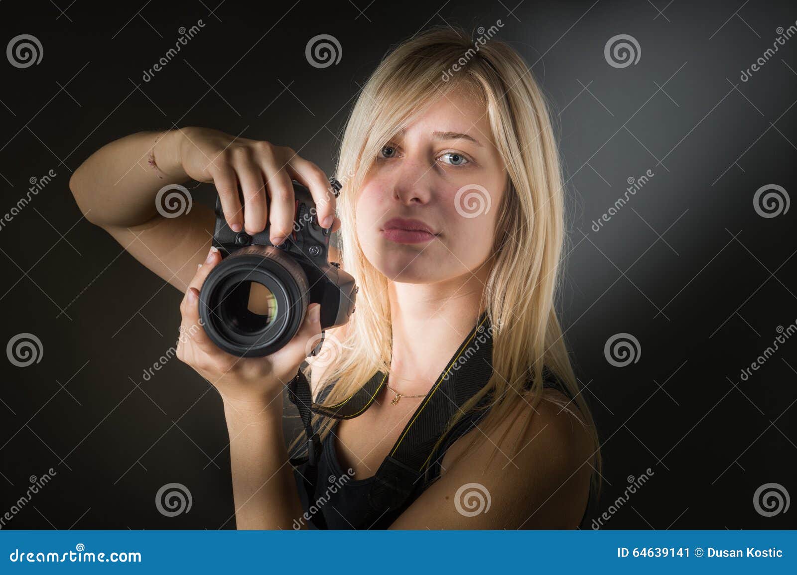 Young woman with camera stock image. Image of camera - 64639141