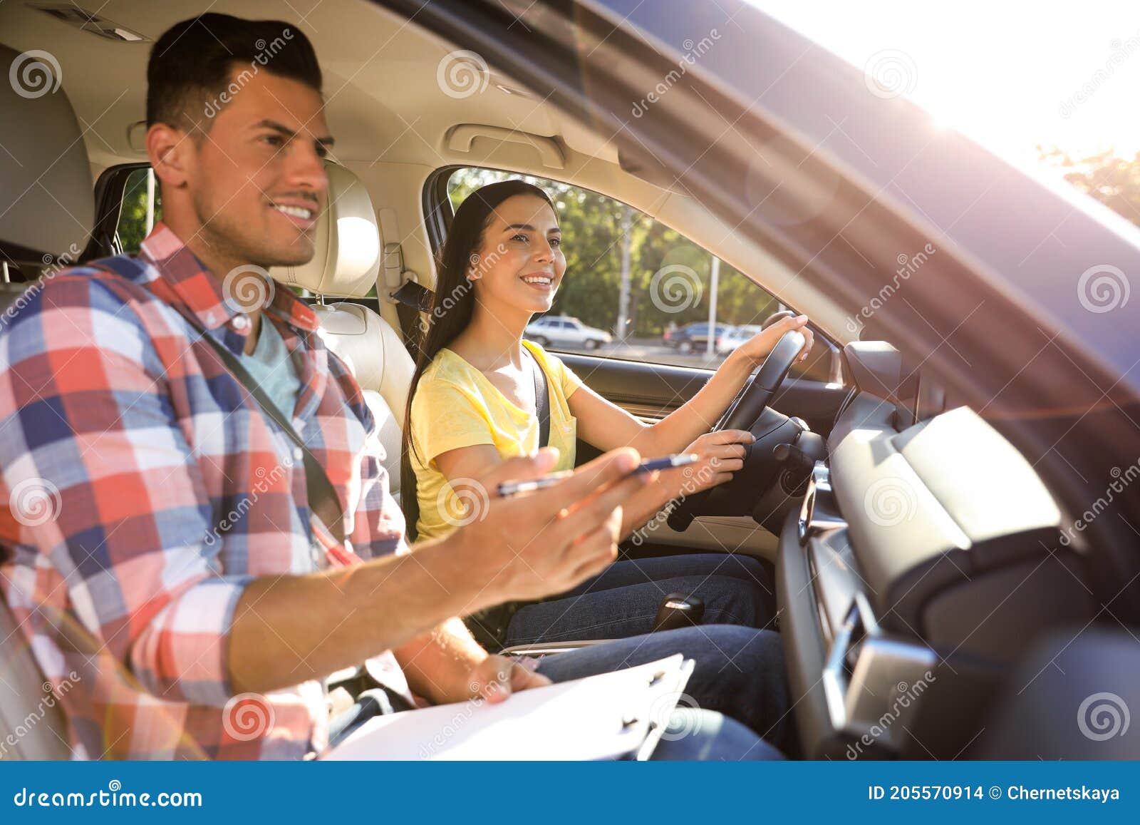 Young Woman in Car with Instructor. Driving School Stock Photo - Image ...