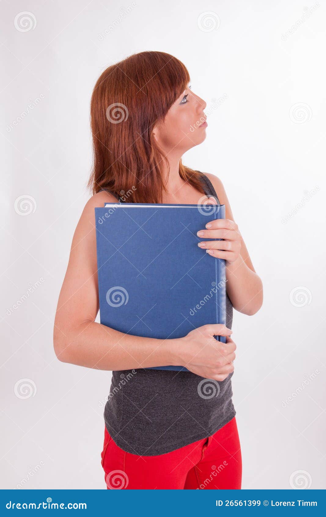 A Young Woman is Carrying a Book Stock Image - Image of white, books ...