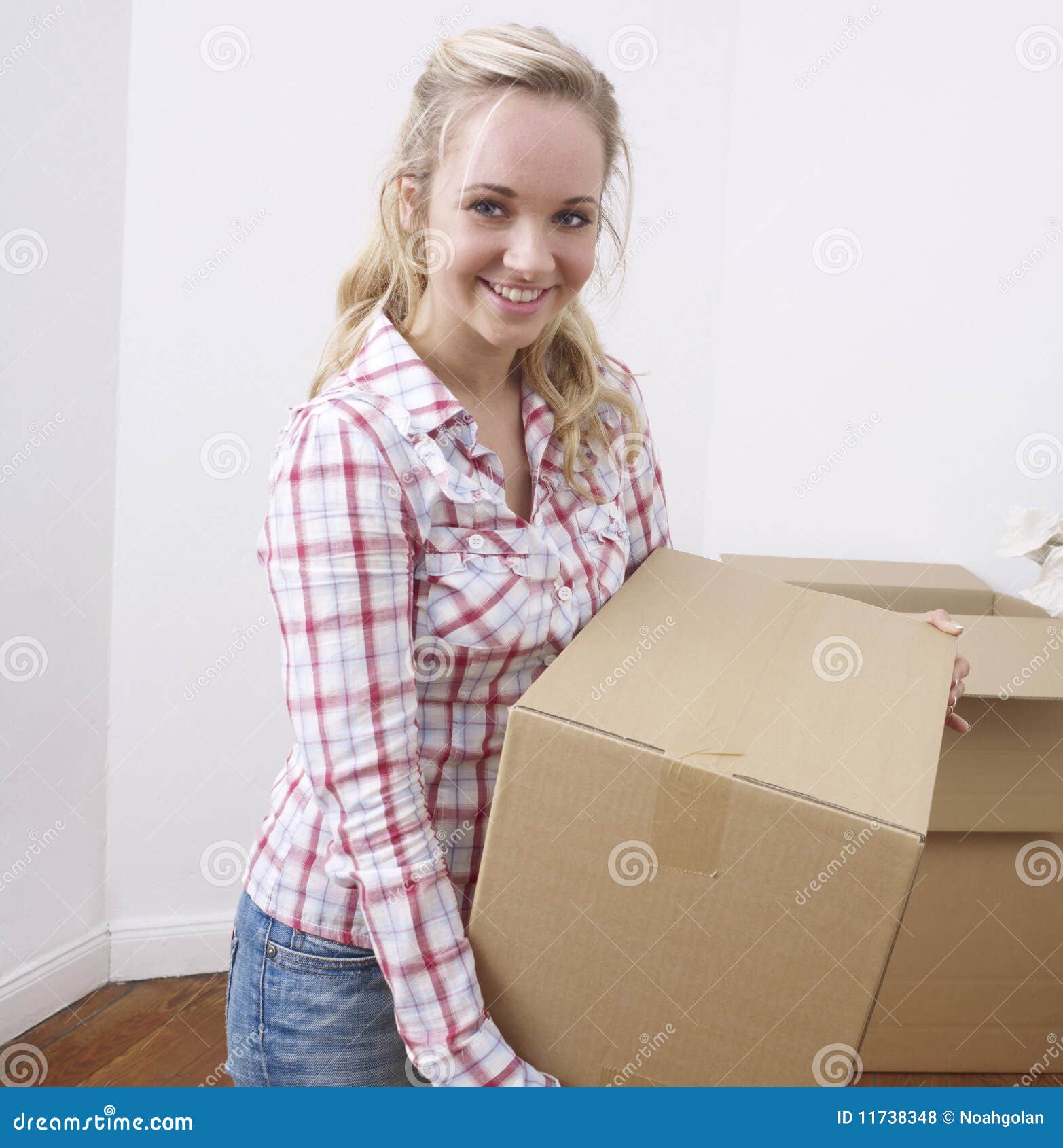 Young woman carrying box stock photo. Image of delivers - 11738348