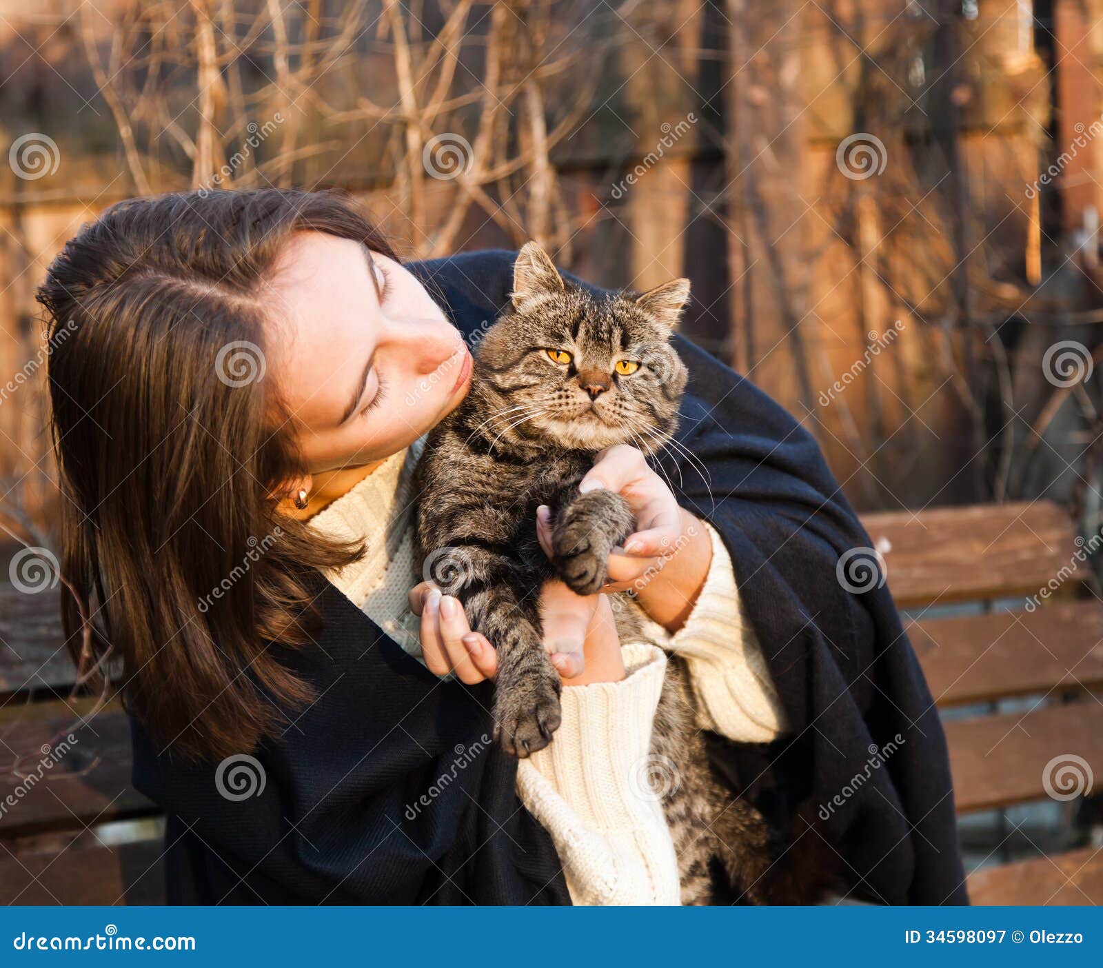 Young woman with a cat stock image. Image of domestic - 34598097