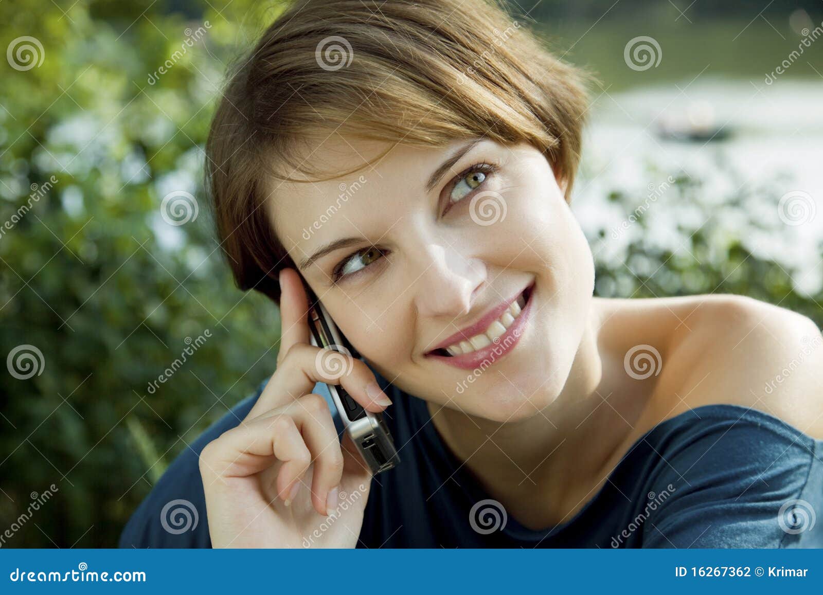 Young Woman with a Cell Phone Stock Photo - Image of grass, fresh: 16267362