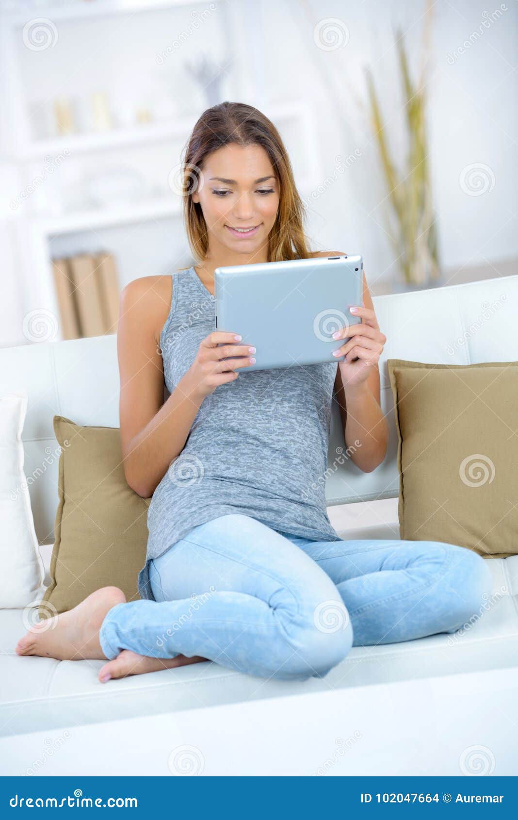 Young Woman Checking Emails while Using Digital Tablet Stock Photo ...