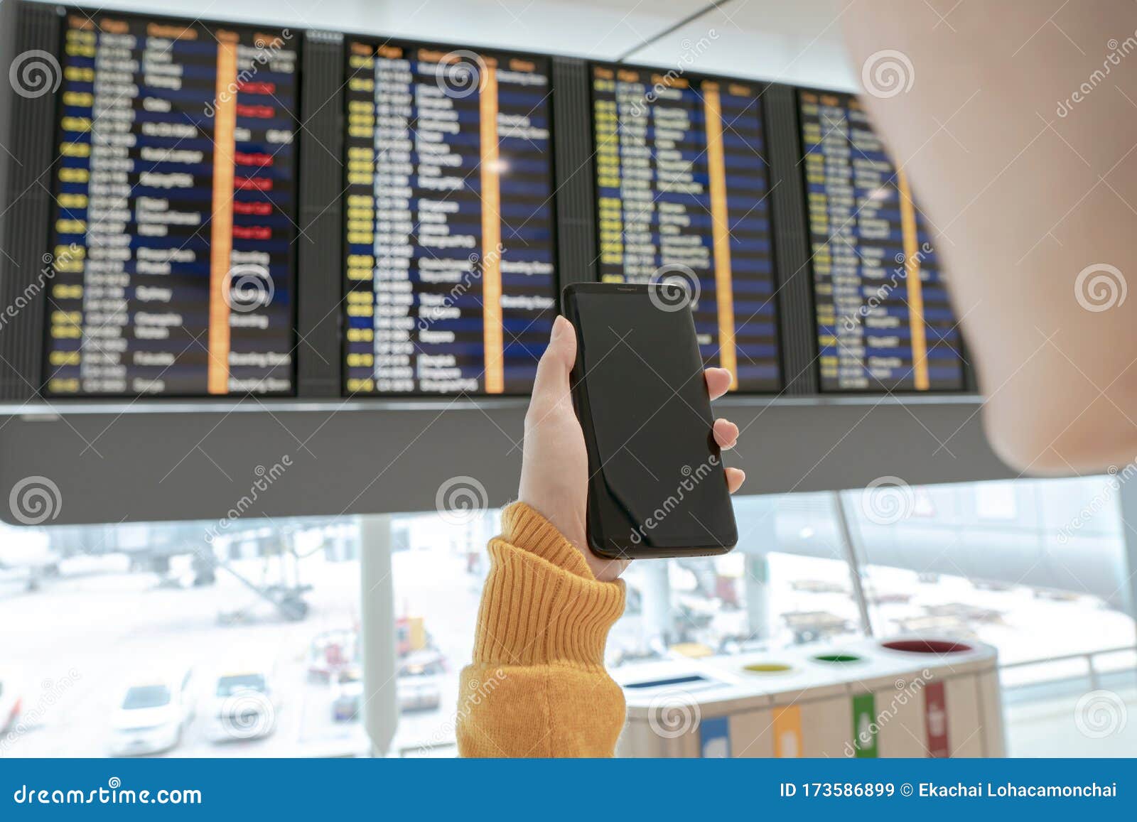 Young Woman Checking Flight on Timetable Stock Image - Image of ...