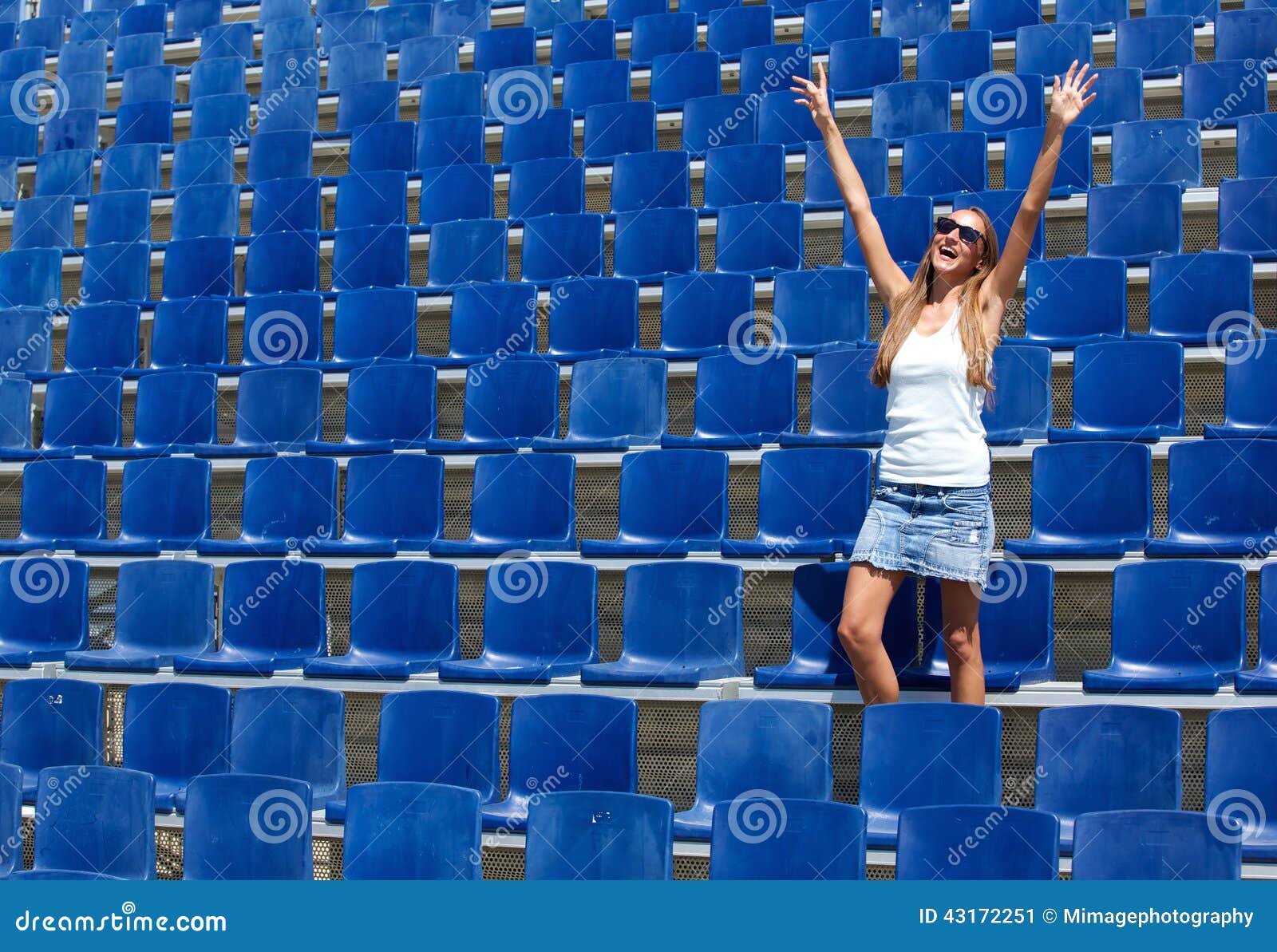 Young woman cheering stock image. Image of auditorium - 43172251