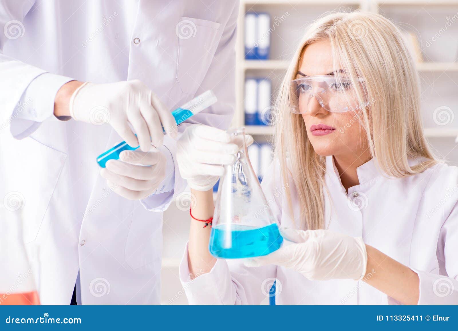 The Young Woman Chemist Working in Clinic Lab Stock Image - Image of ...