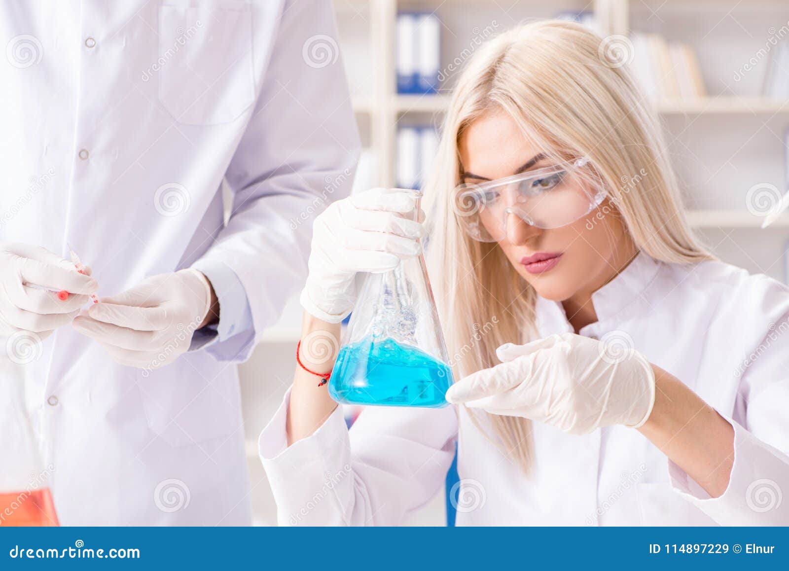 The Young Woman Chemist Working in Clinic Lab Stock Image - Image of ...