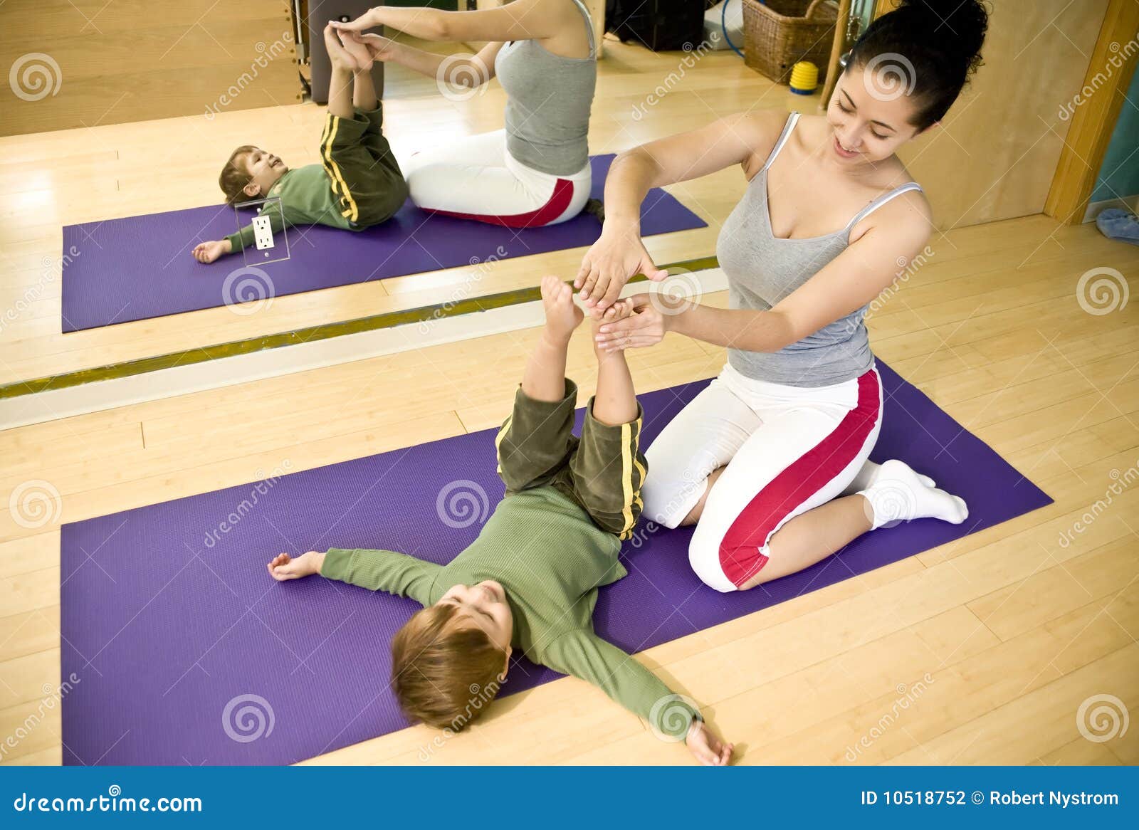 Young Woman and Child Doing Pilates Stock Photo - Image of classes ...