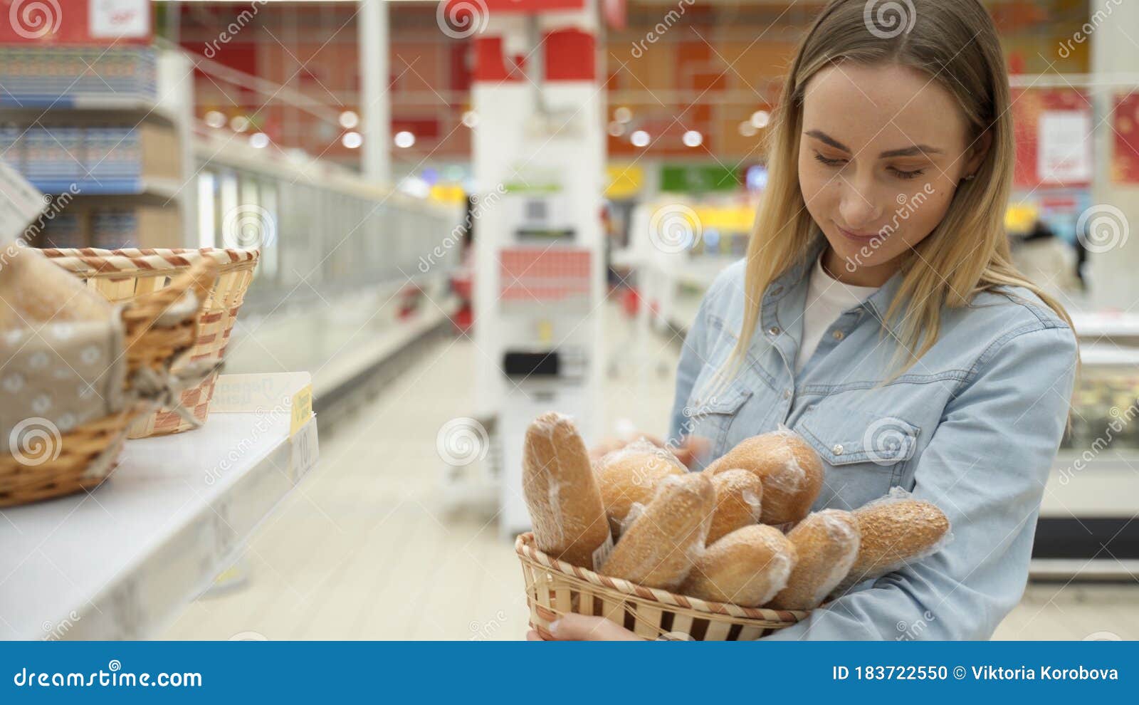Young Woman Chooses Bread in the Store. Stock Photo - Image of ...