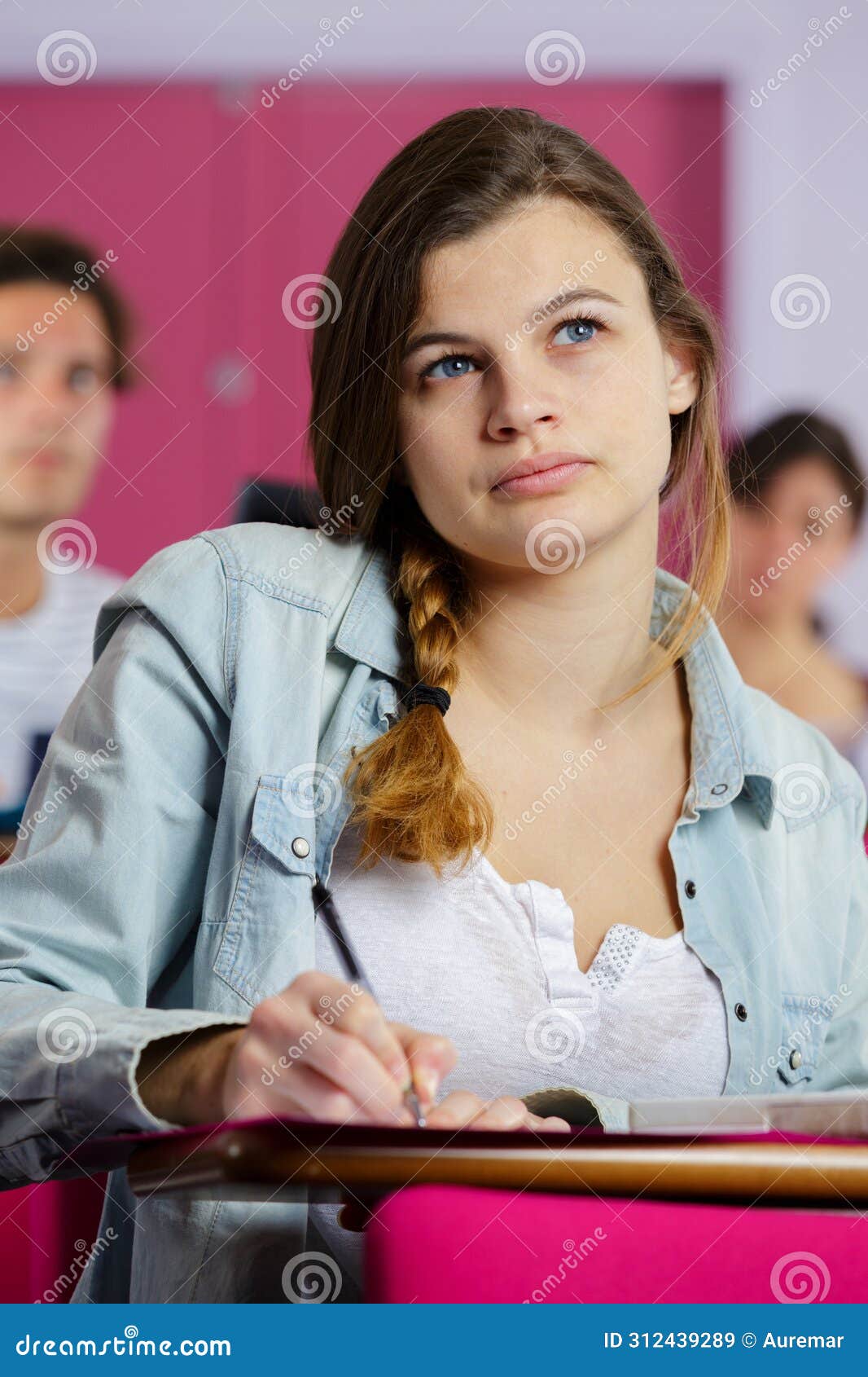 Young Woman in Classroom Concentrating on Their Test Stock Image ...