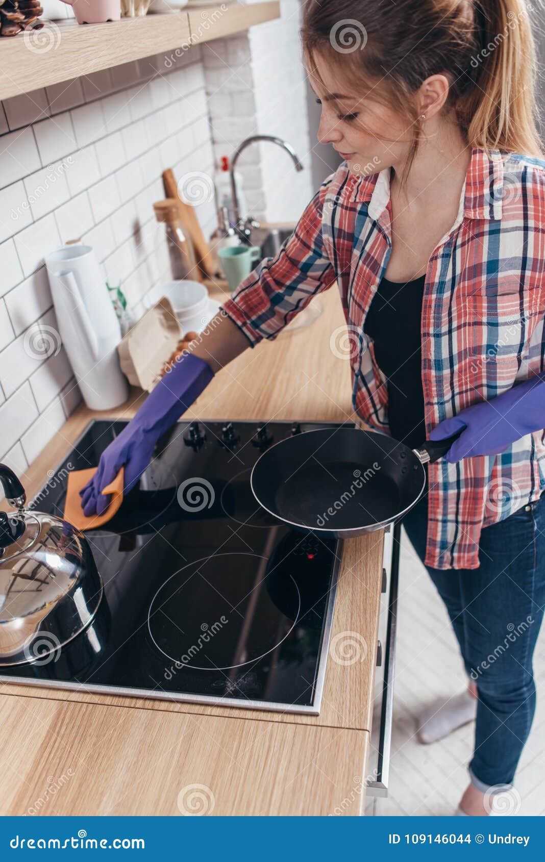 Young Woman Cleaning Countertop in the Kitchen Stock Photo - Image of ...
