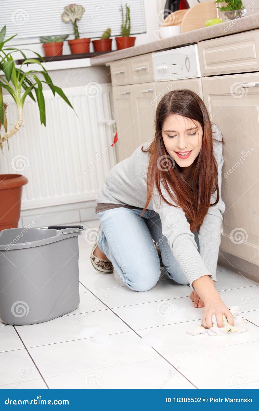 Young woman cleaning flor stock photo. Image of happy - 18305502