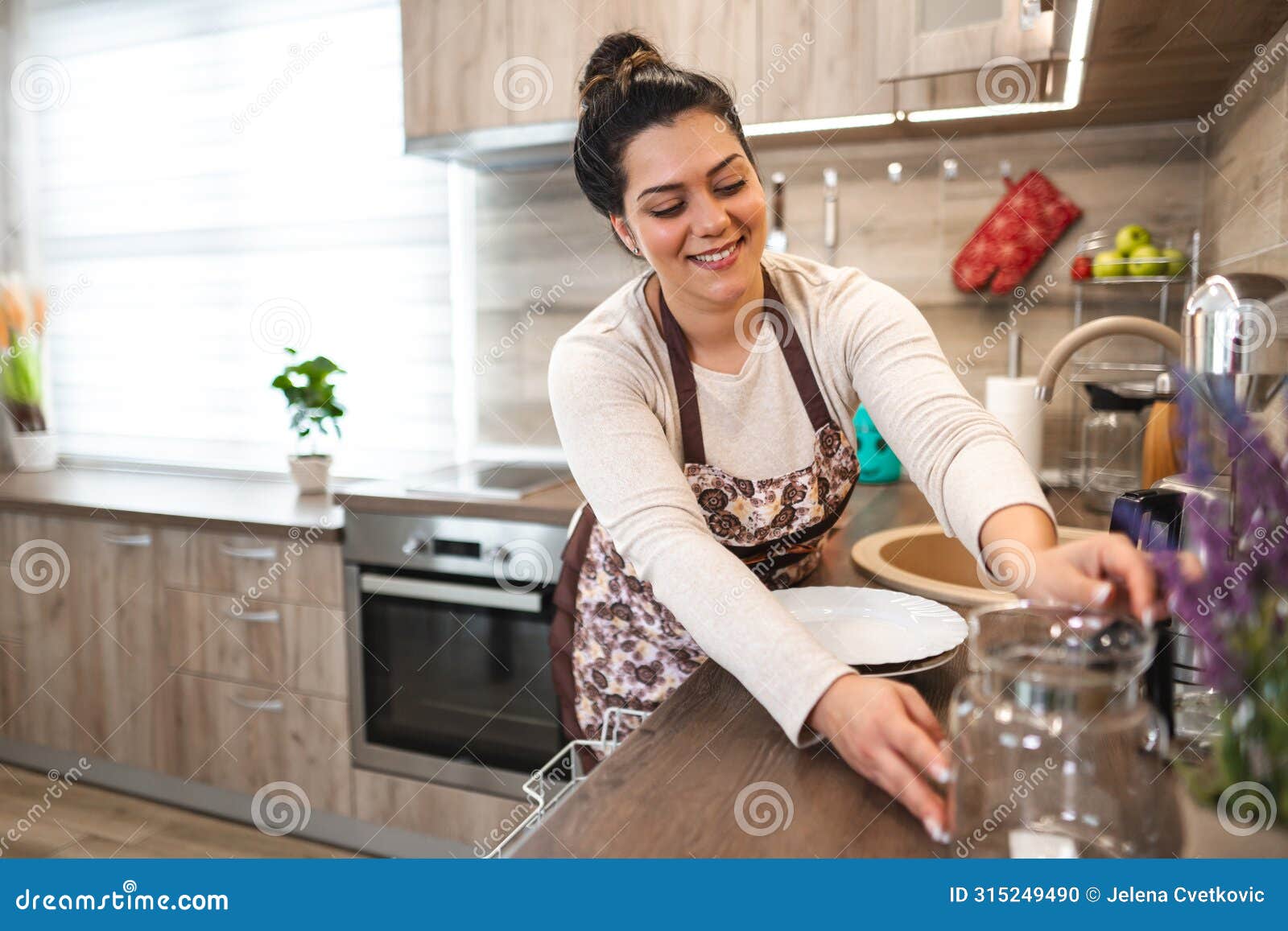 Young Woman Cleaning the Kitchen Stock Photo - Image of adult, people ...