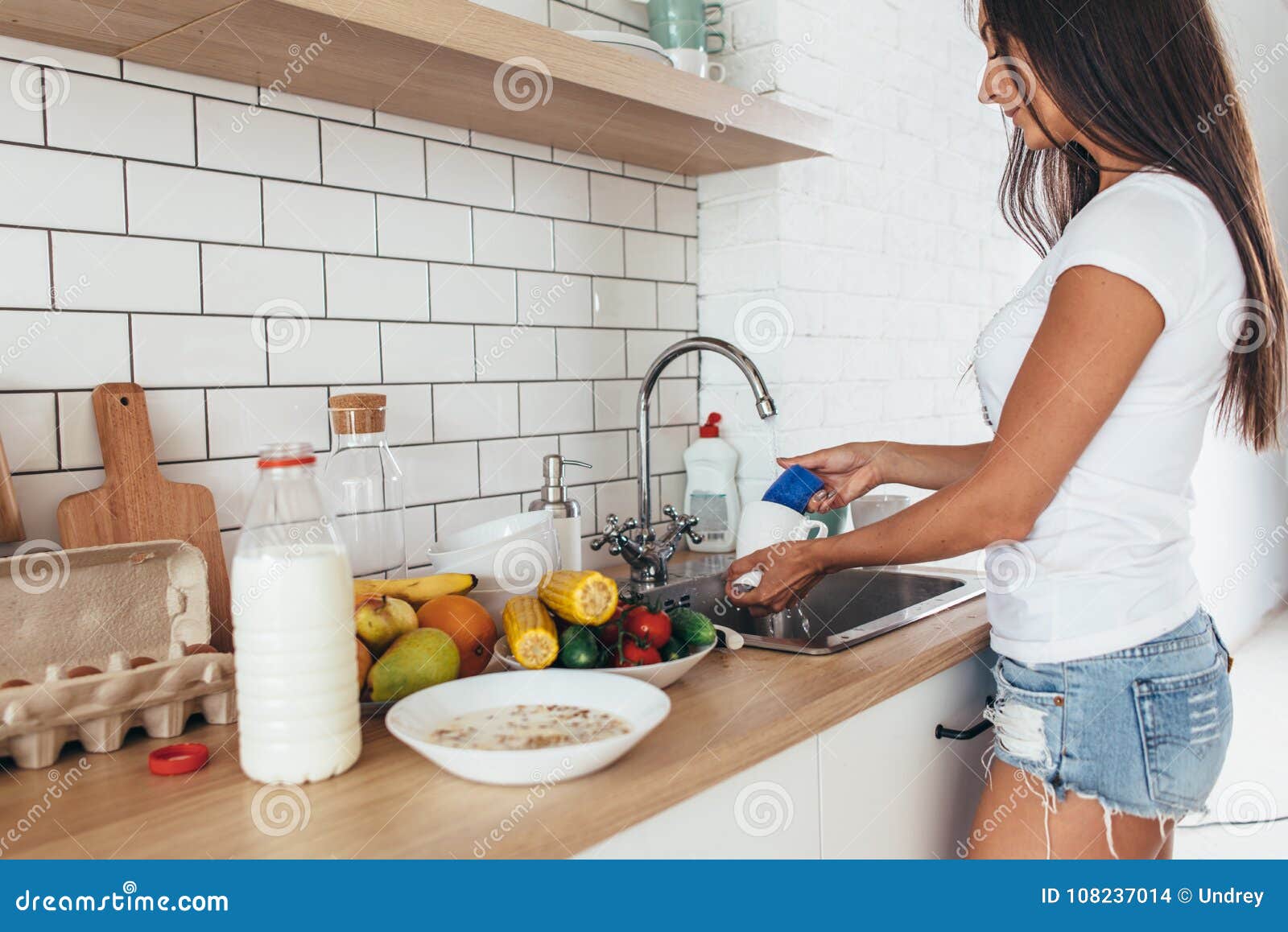 Young Woman Cleaning in the Kitchen. Housework Stock Photo - Image of ...