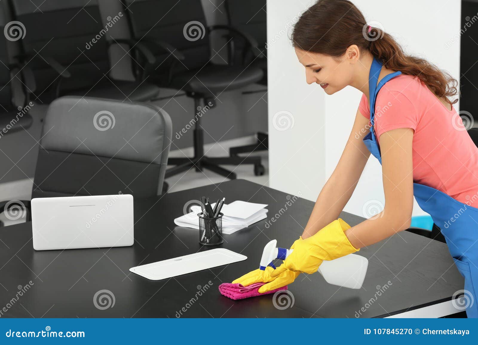 Young Woman Cleaning Office Stock Photo - Image of bottle, gloves ...