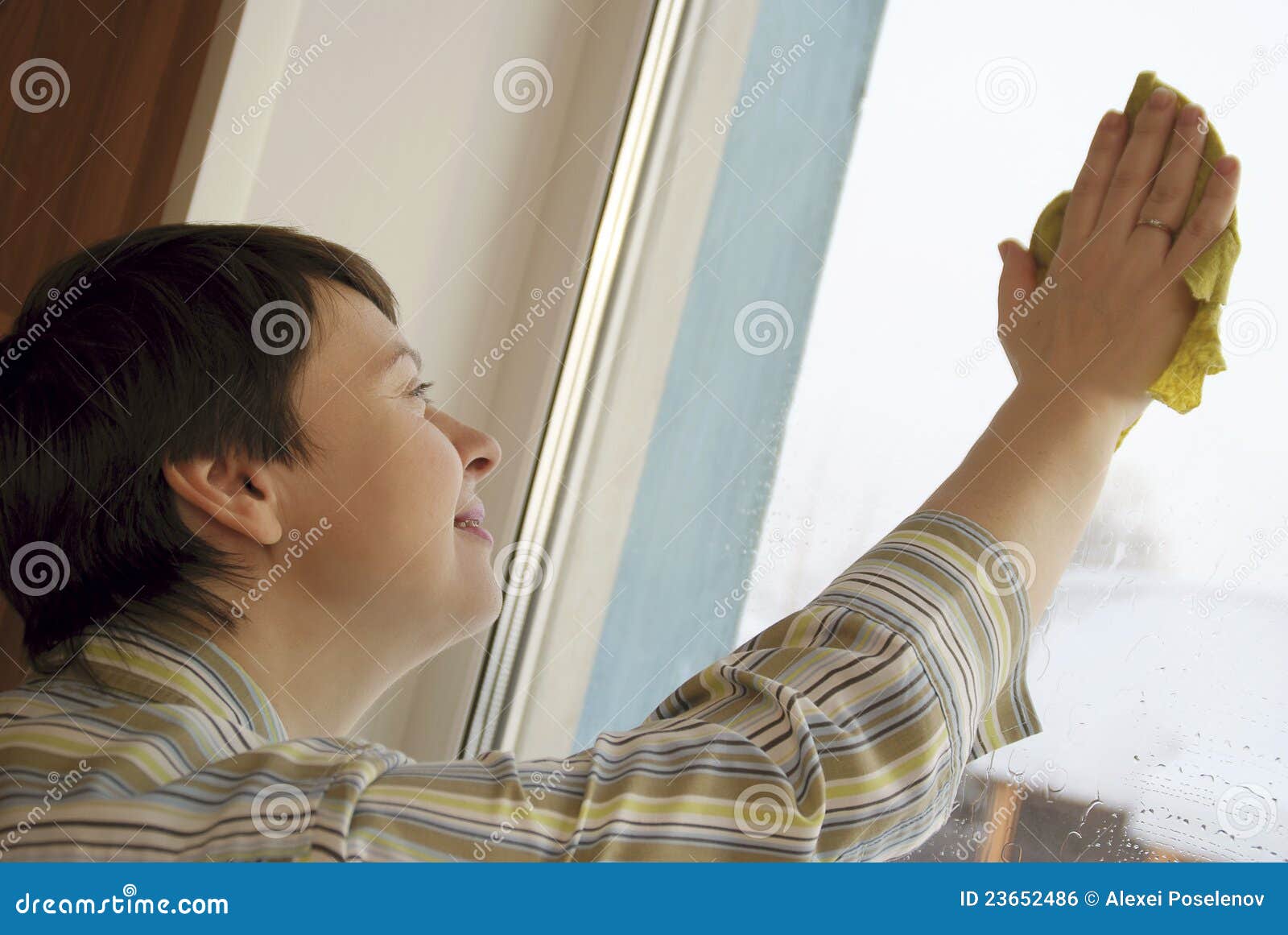 Young Woman is Cleaning a Window Stock Photo - Image of window ...