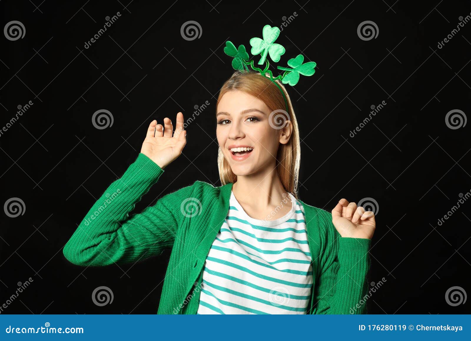 Young Woman With Clover Headband On Background St Patrick`s Day