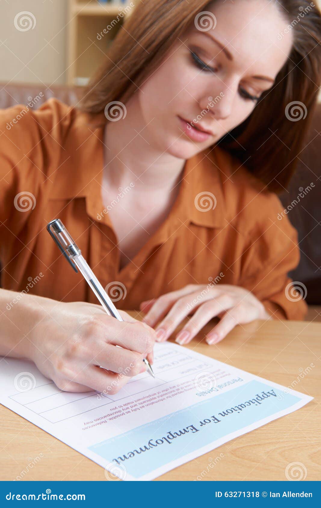Young Woman Completing Employment Application Form Stock Photo - Image ...