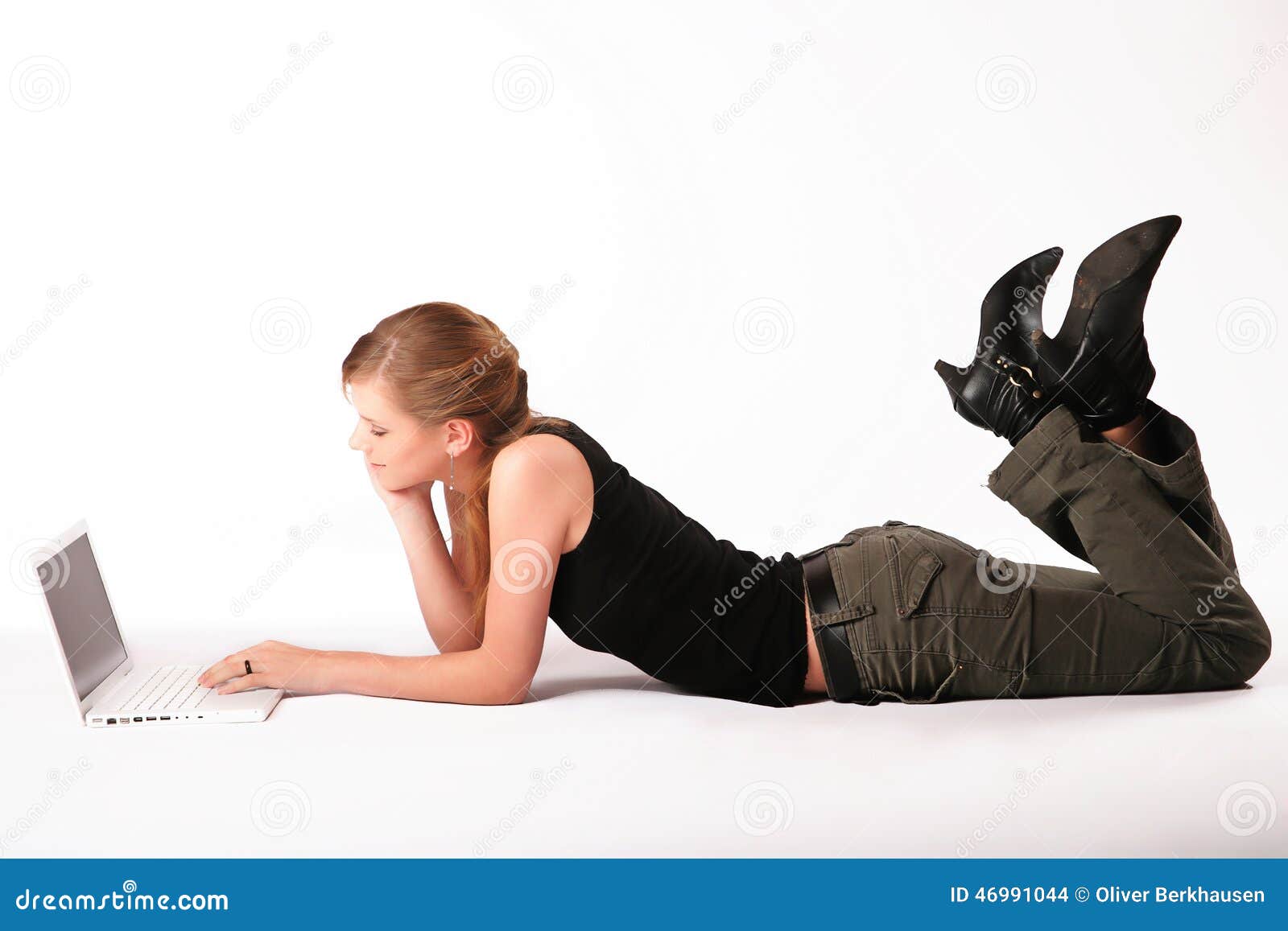 Young woman with computer stock photo. Image of blonde - 46991044