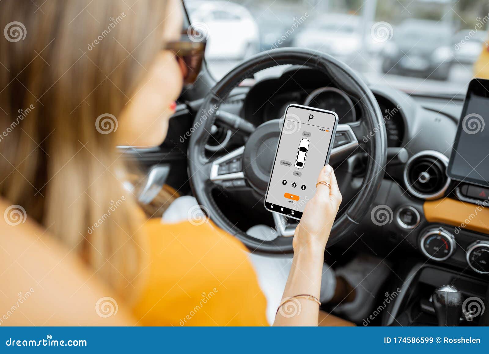 Woman Controlling Car with a Smart Phone Stock Image - Image of smart ...