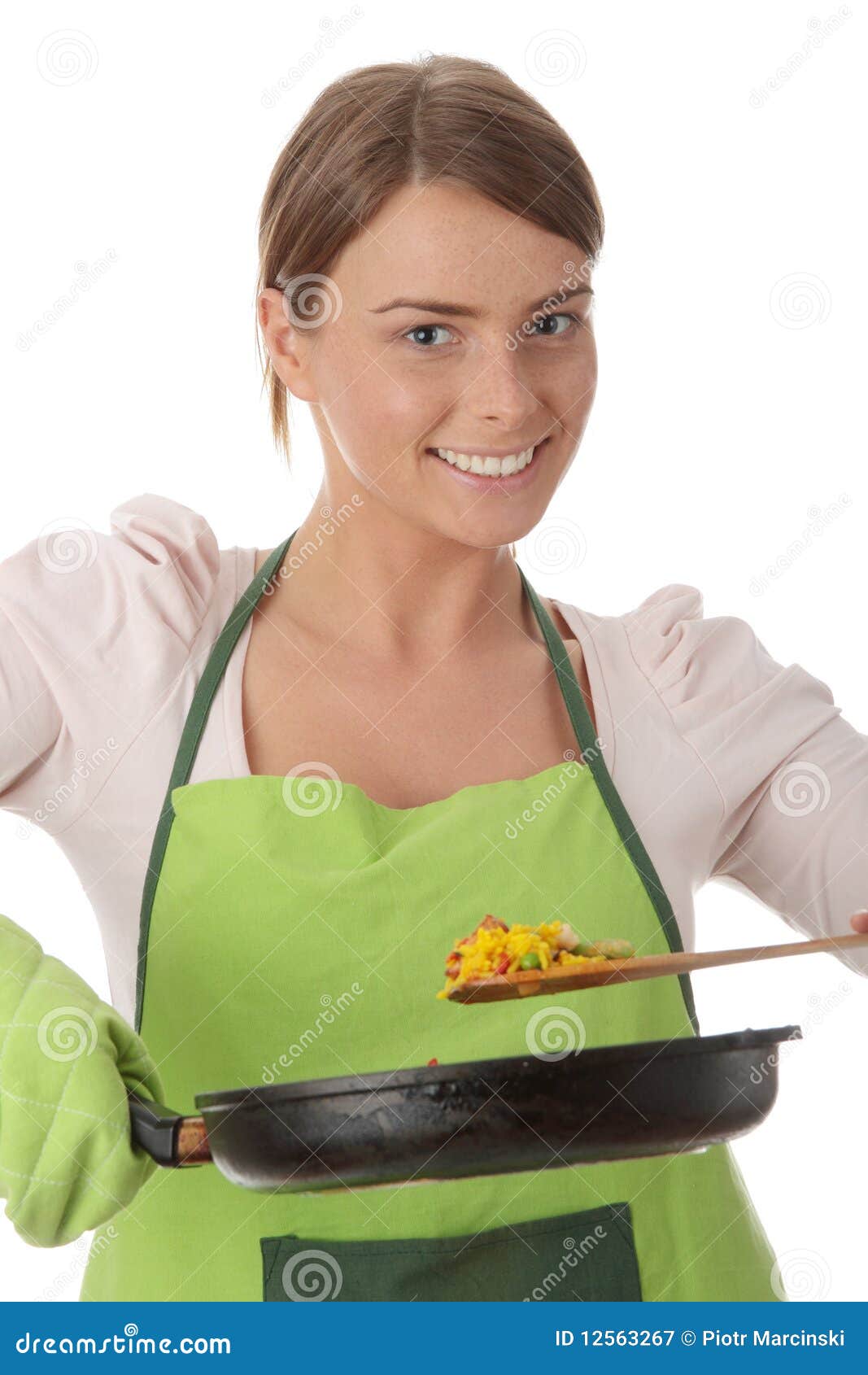 Young woman cooking stock image. Image of adult, dishes - 12563267