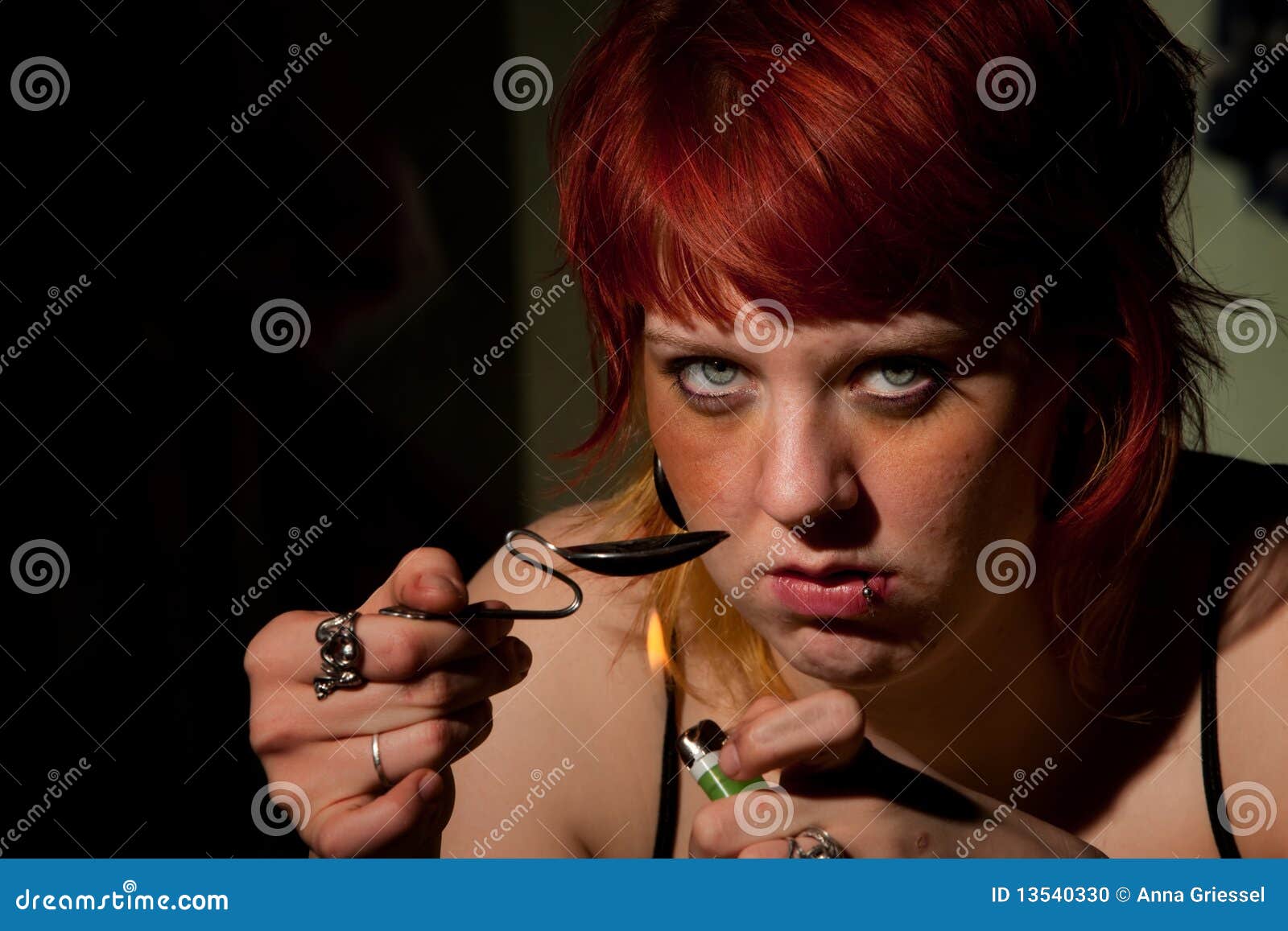 Young Woman Cooking Heroin in a Spoon Stock Photo - Image of alone ...