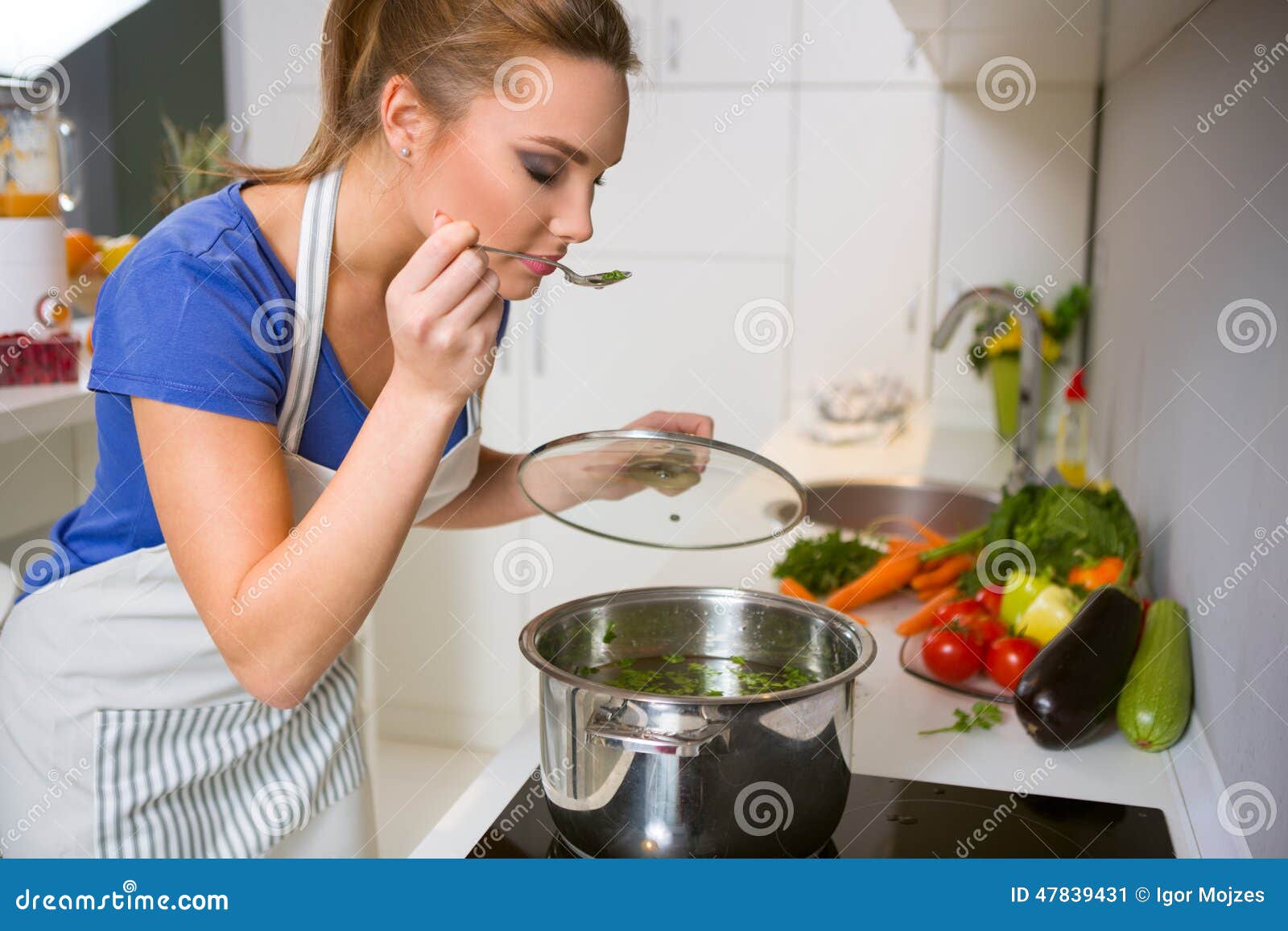 Young Woman Cooking at Kitchen Stock Image - Image of girl, domestic ...