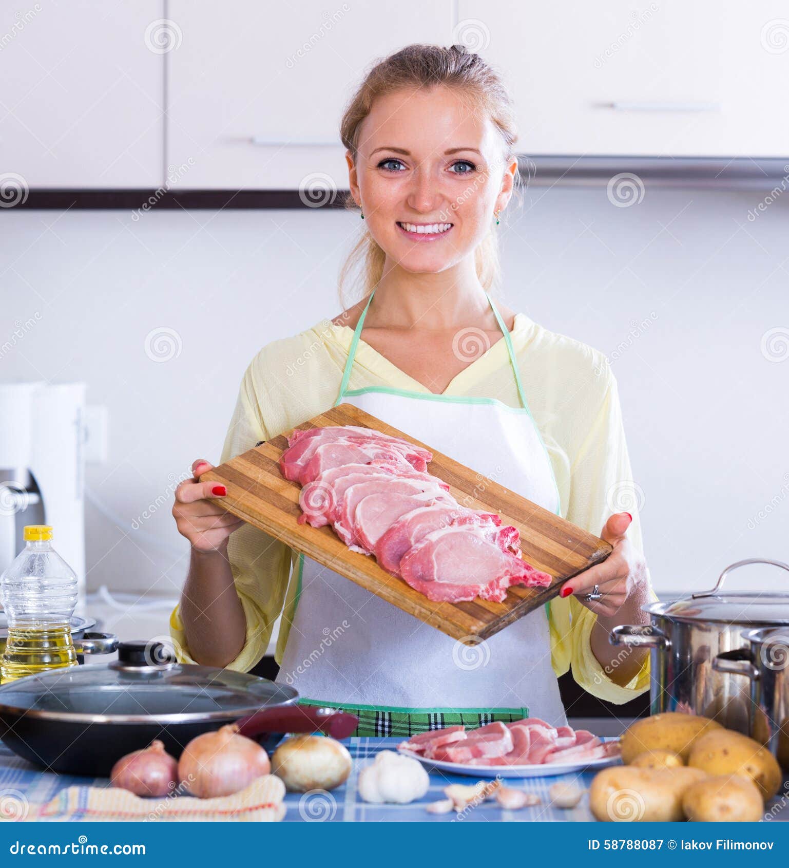 Young Woman Cooking Meat at Home Stock Image - Image of happy, book ...