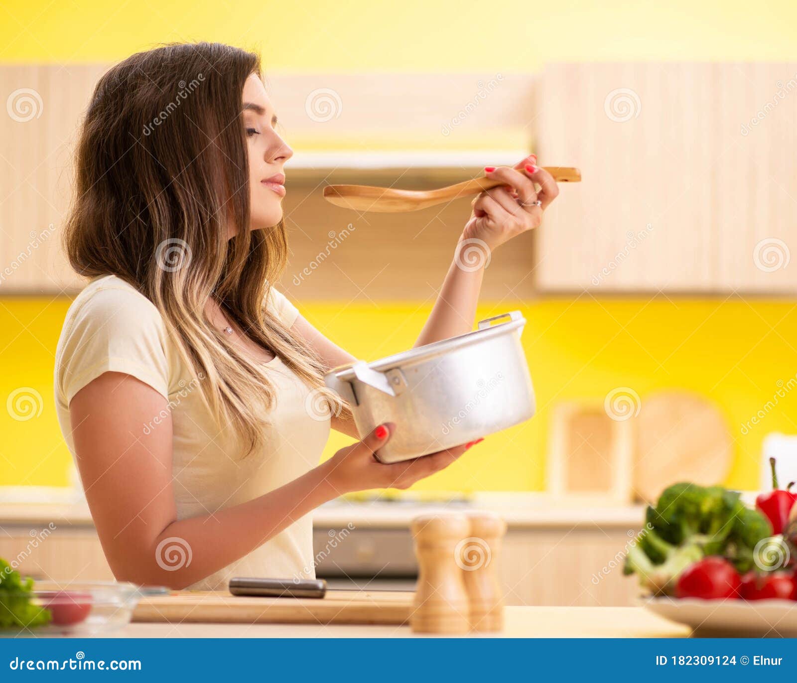 Young Woman Cooking Soup in Kitchen at Home Stock Photo - Image of ...