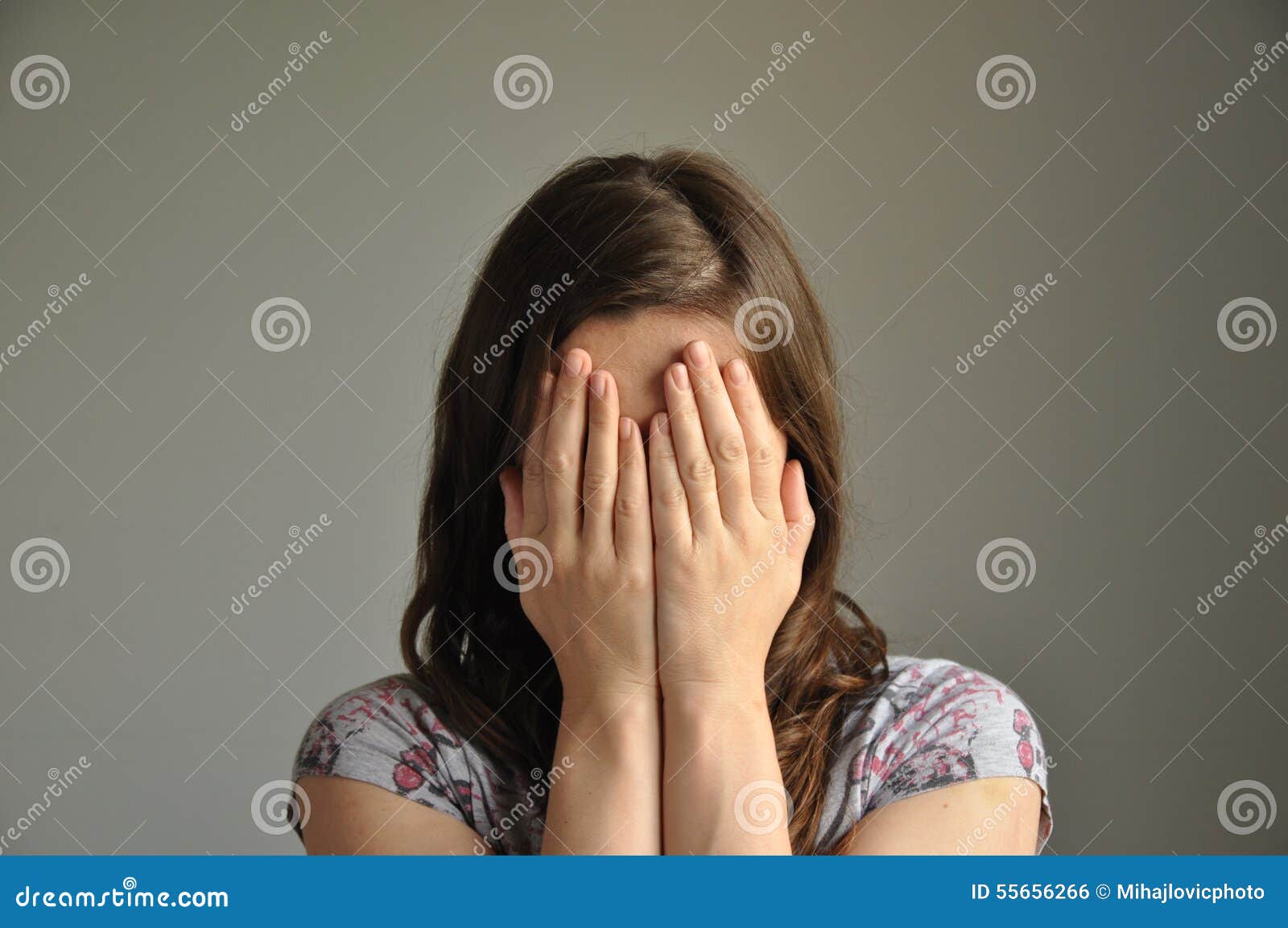A Young Woman Covers Her Face with Hands Stock Photo - Image of covers ...