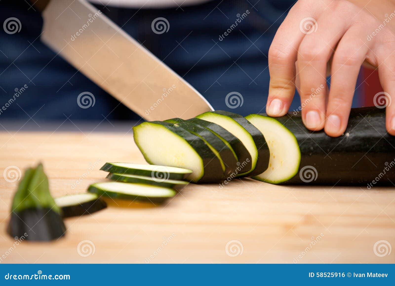 Young Woman Cutting Zucchini Stock Photo - Image of cooking, hand: 58525916