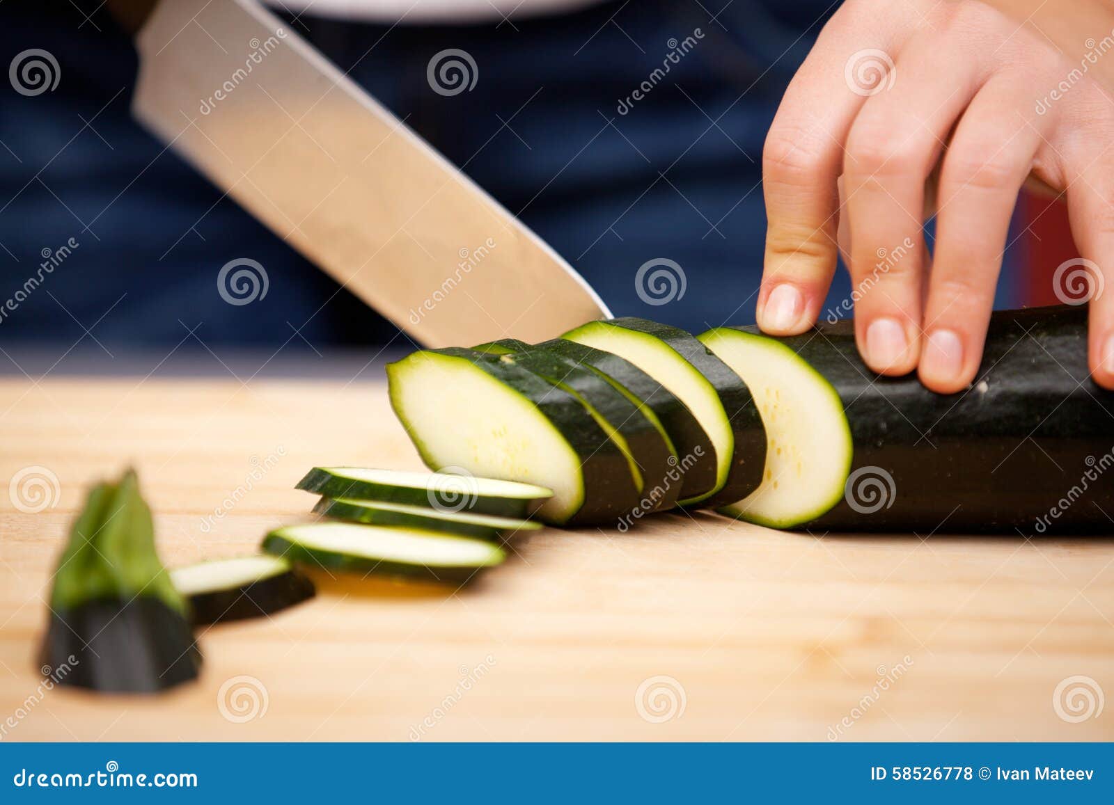 Young Woman Cutting Zucchini Stock Photo - Image of cooked, kitchen ...