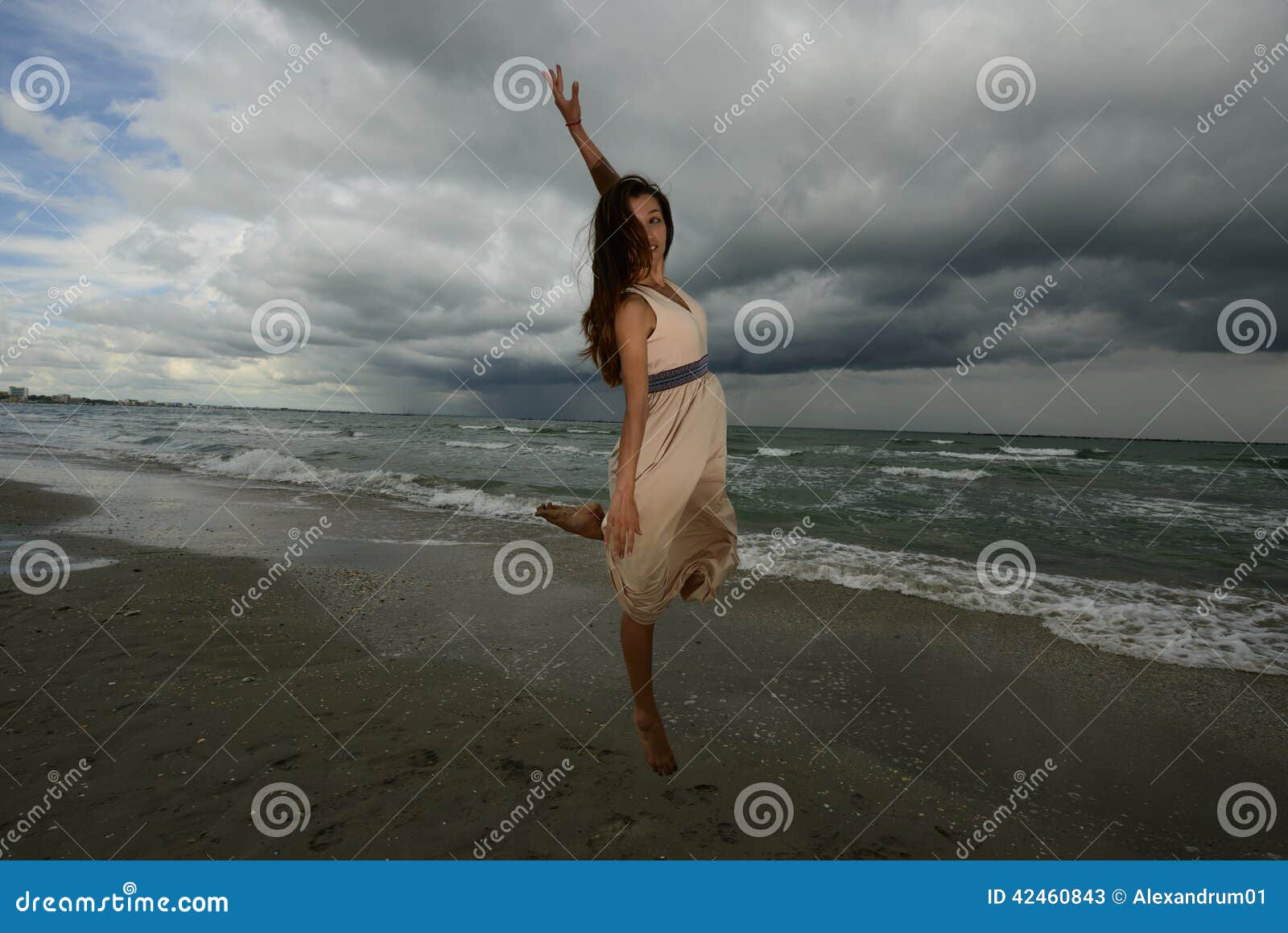 Young Woman Dancing on a Beach Stock Image - Image of beach, nature ...