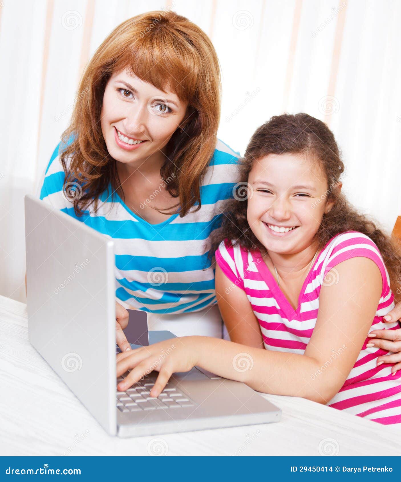 Young Woman with Daughter Using Laptop Computer Stock Photo - Image of ...