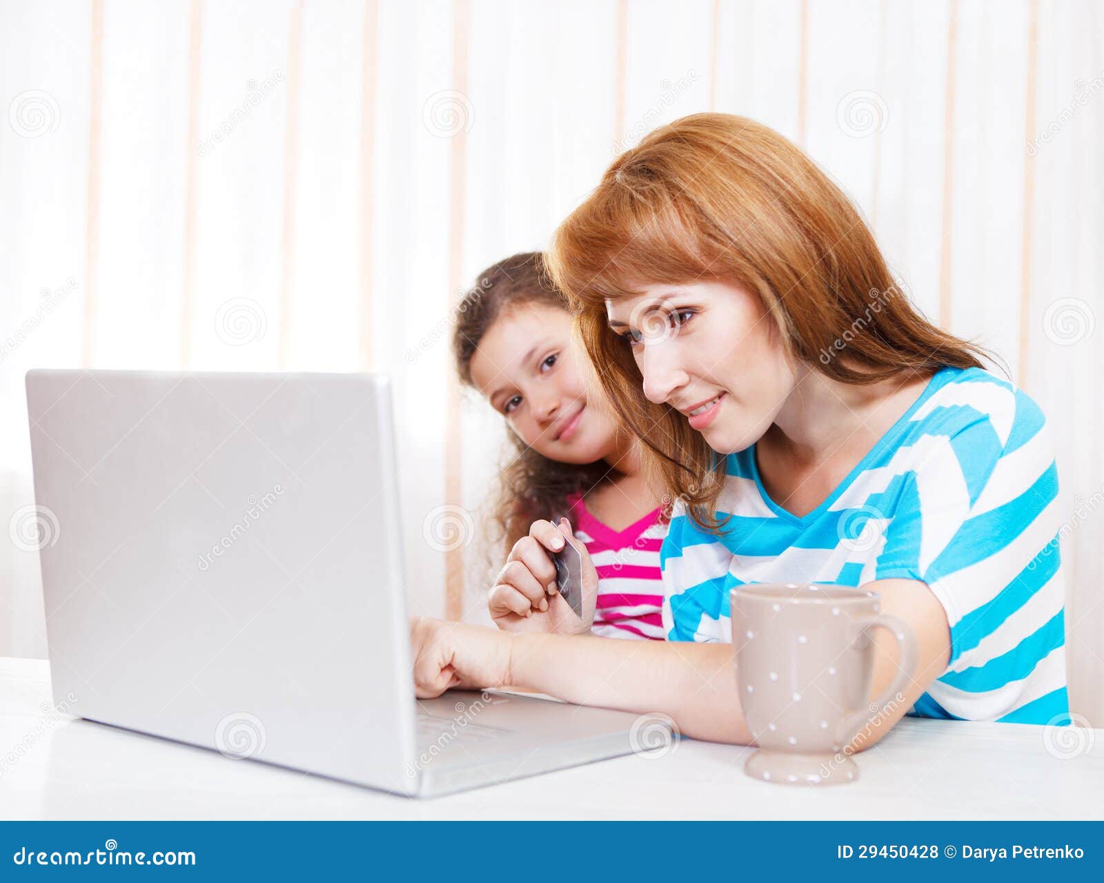 Young Woman with Daughter Using Laptop Computer Stock Photo - Image of ...