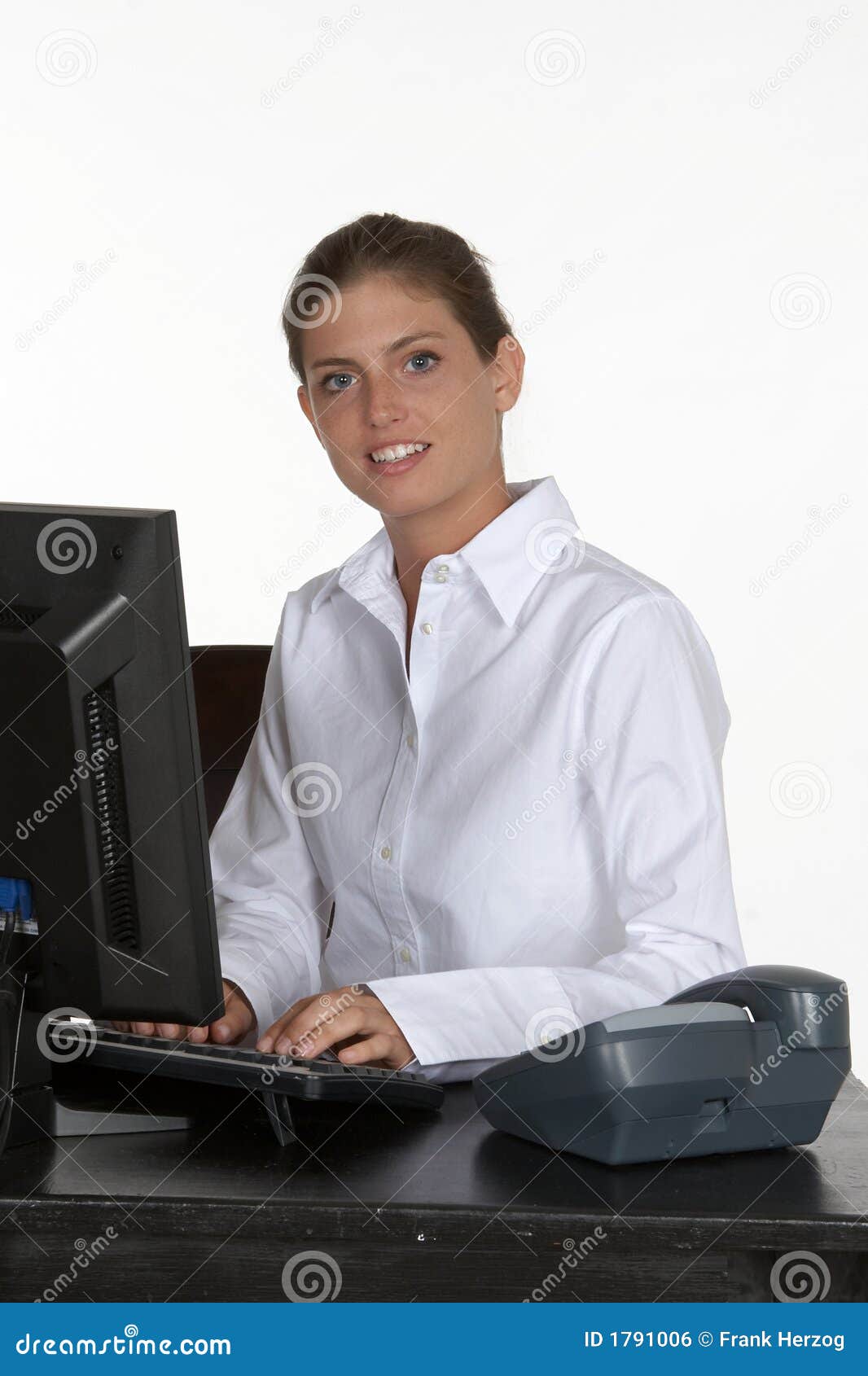 Young Woman at Desk with Computer and Phone Stock Photo - Image of ...