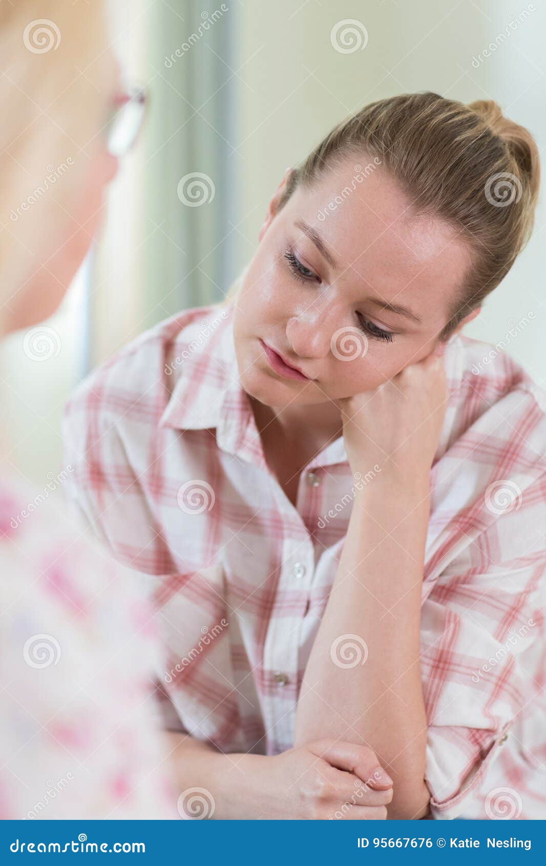 Young Woman Discussing Problems with Counselor Stock Photo - Image of ...