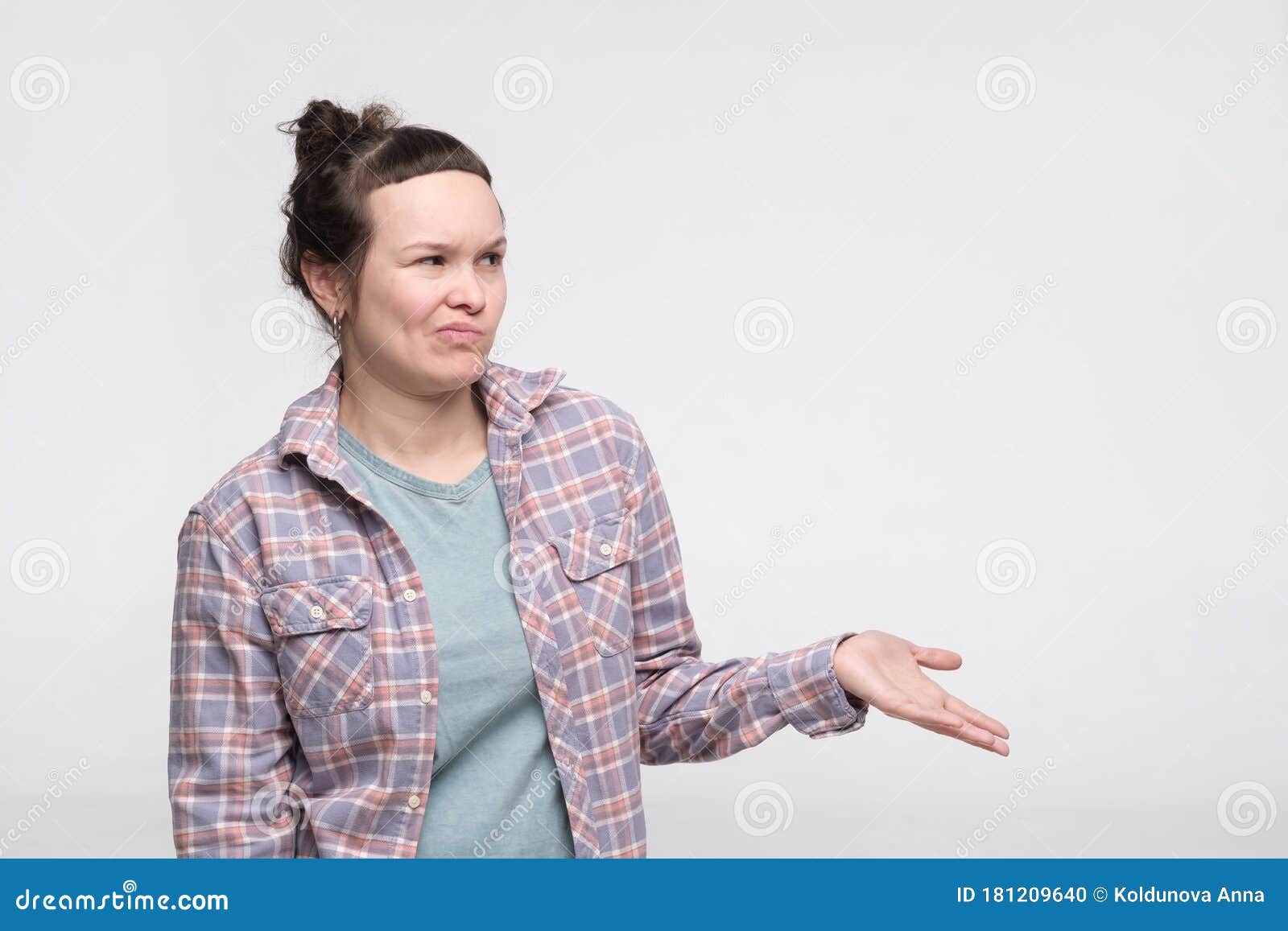 Young Woman with Disgusted Expression Showing on Empty Copyspace Stock ...