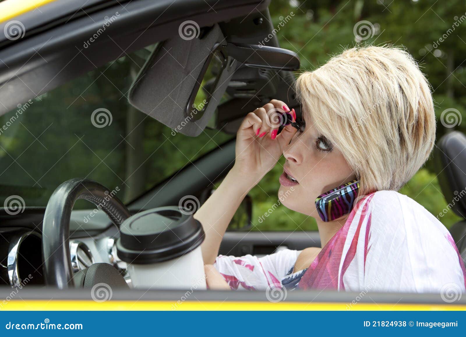Young Woman Distracted while Driving Stock Photo - Image of hair, happy ...
