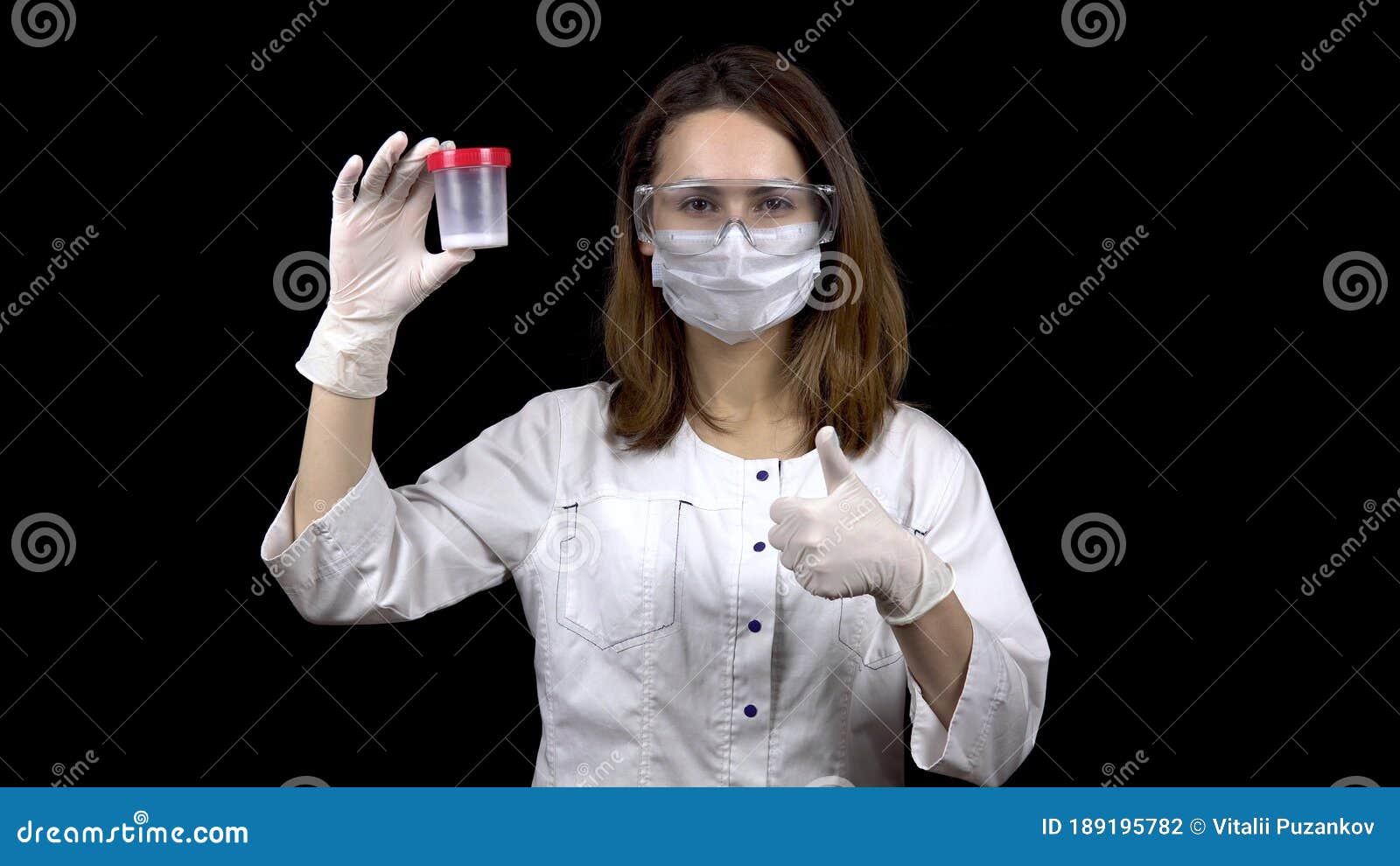 Young Woman Doctor Checks Sperm Tests A Woman Examines A Test Jar